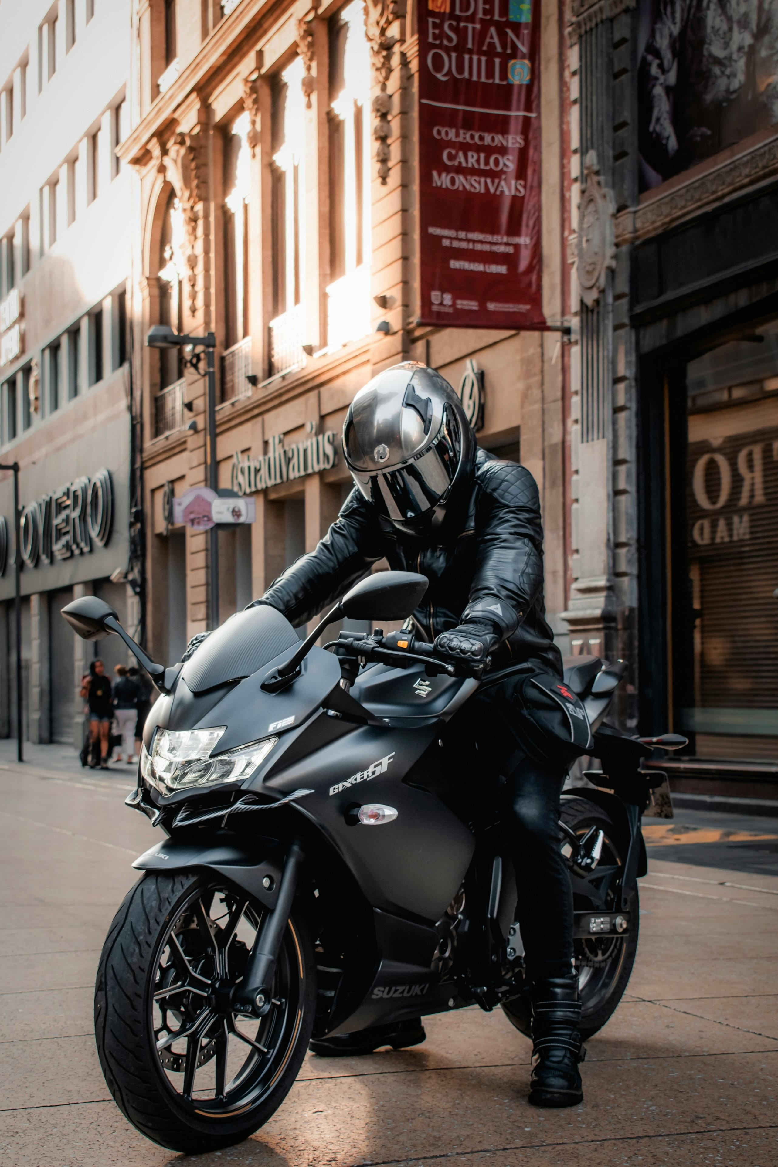 A Man Riding a Motorcycle · Free Stock Photo