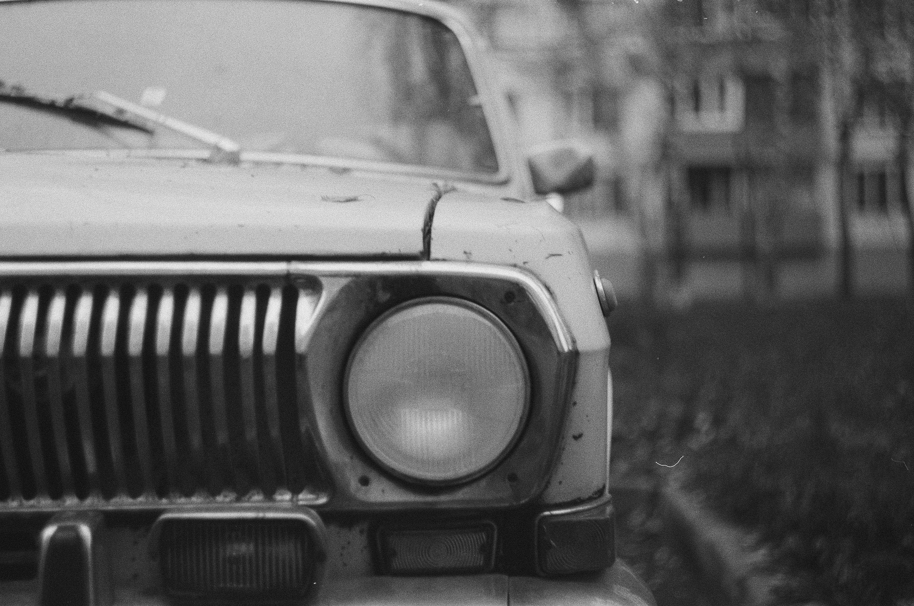 Gray scale Close-up Photo of Car · Free Stock Photo