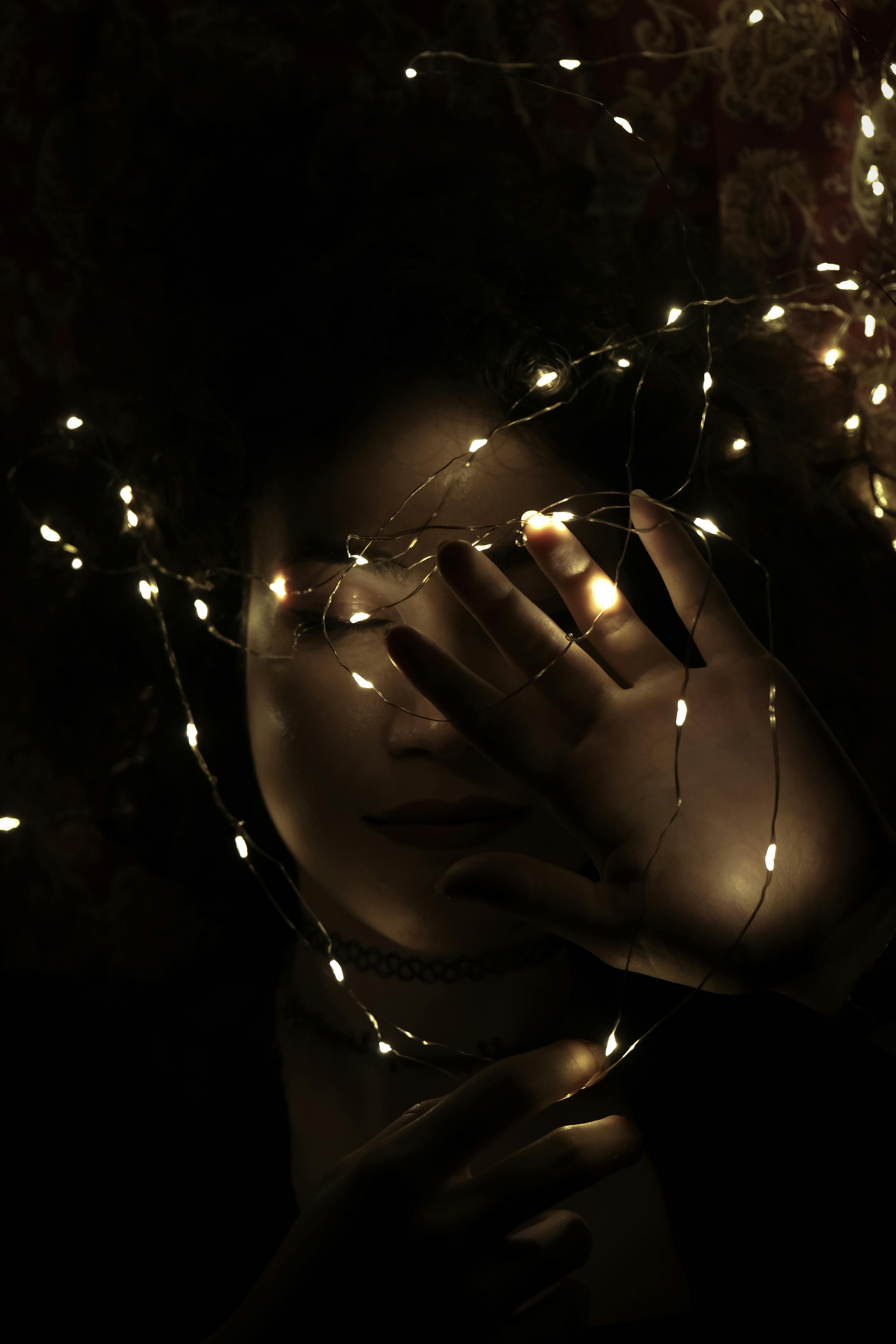 Woman Holding White String Lights · Free Stock Photo