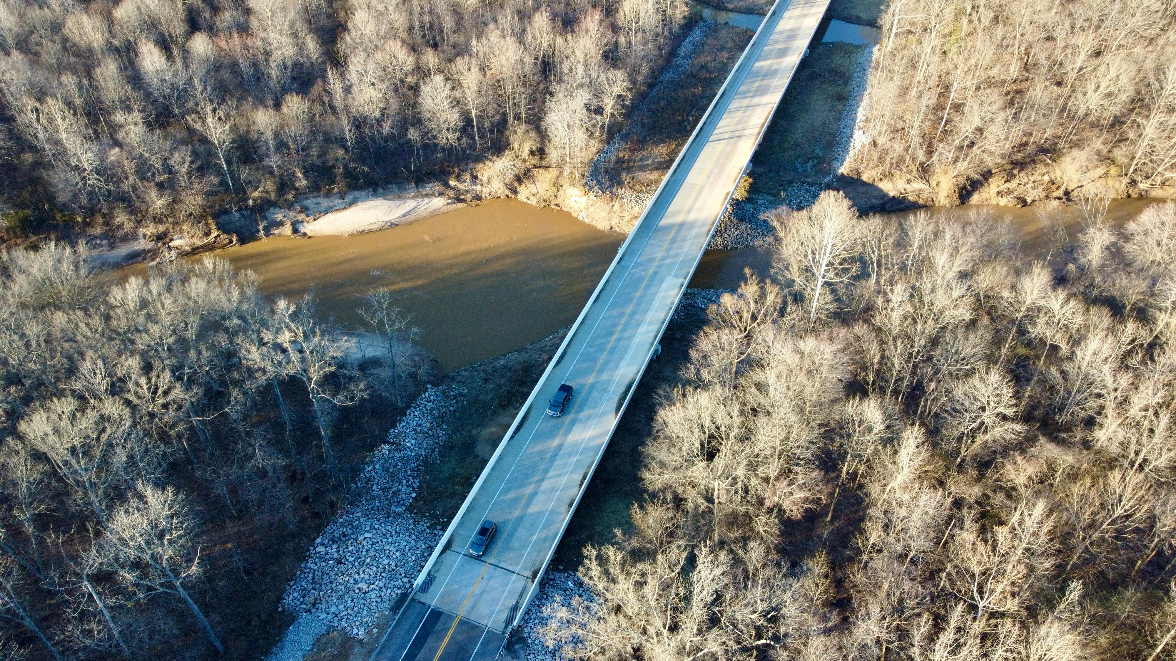 Aerial Photography of Gray Bridge over Body of Water · Free Stock Photo