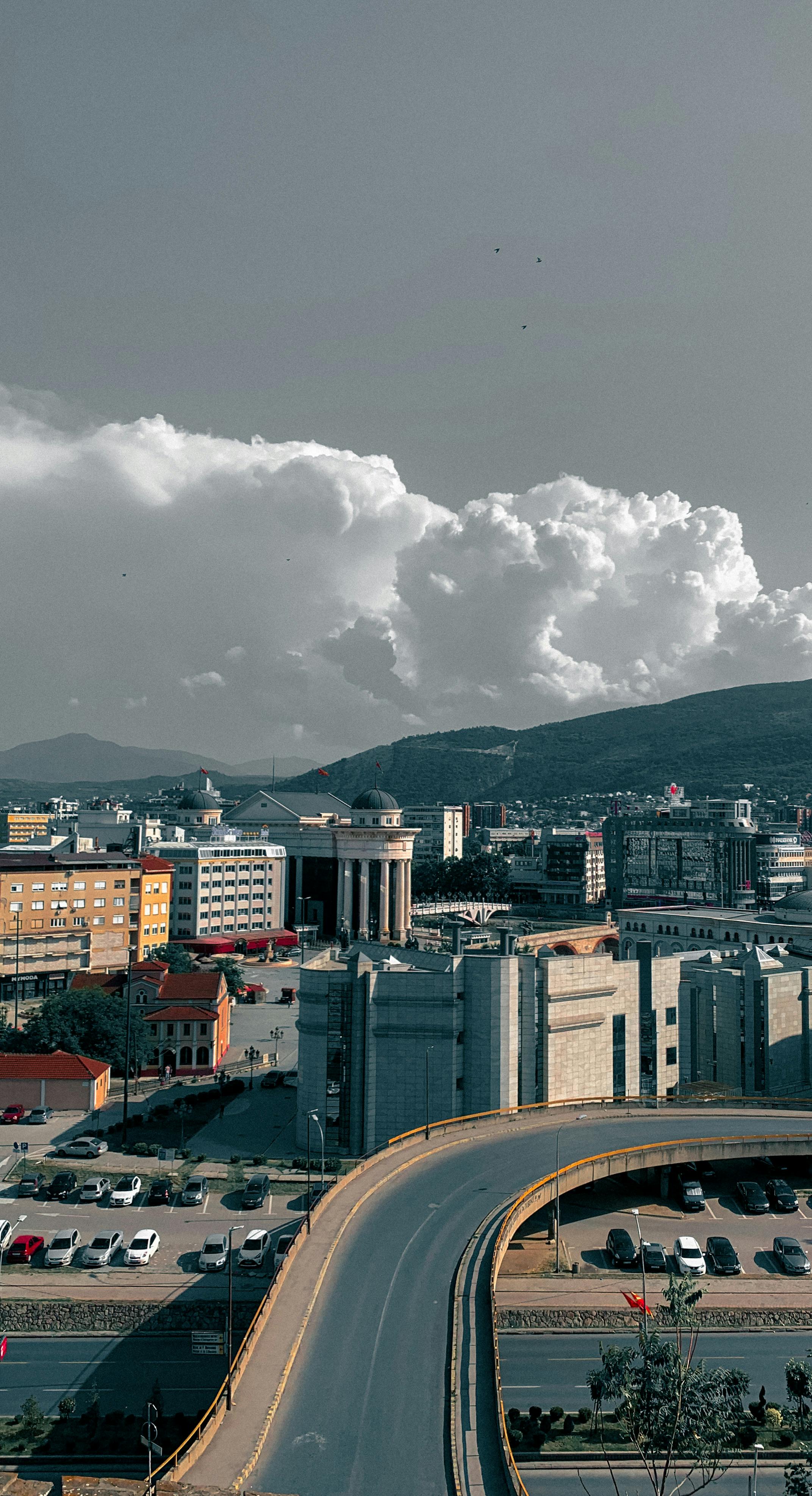 Aerial Shot of a City Under a Cinematic Sky · Free Stock Photo