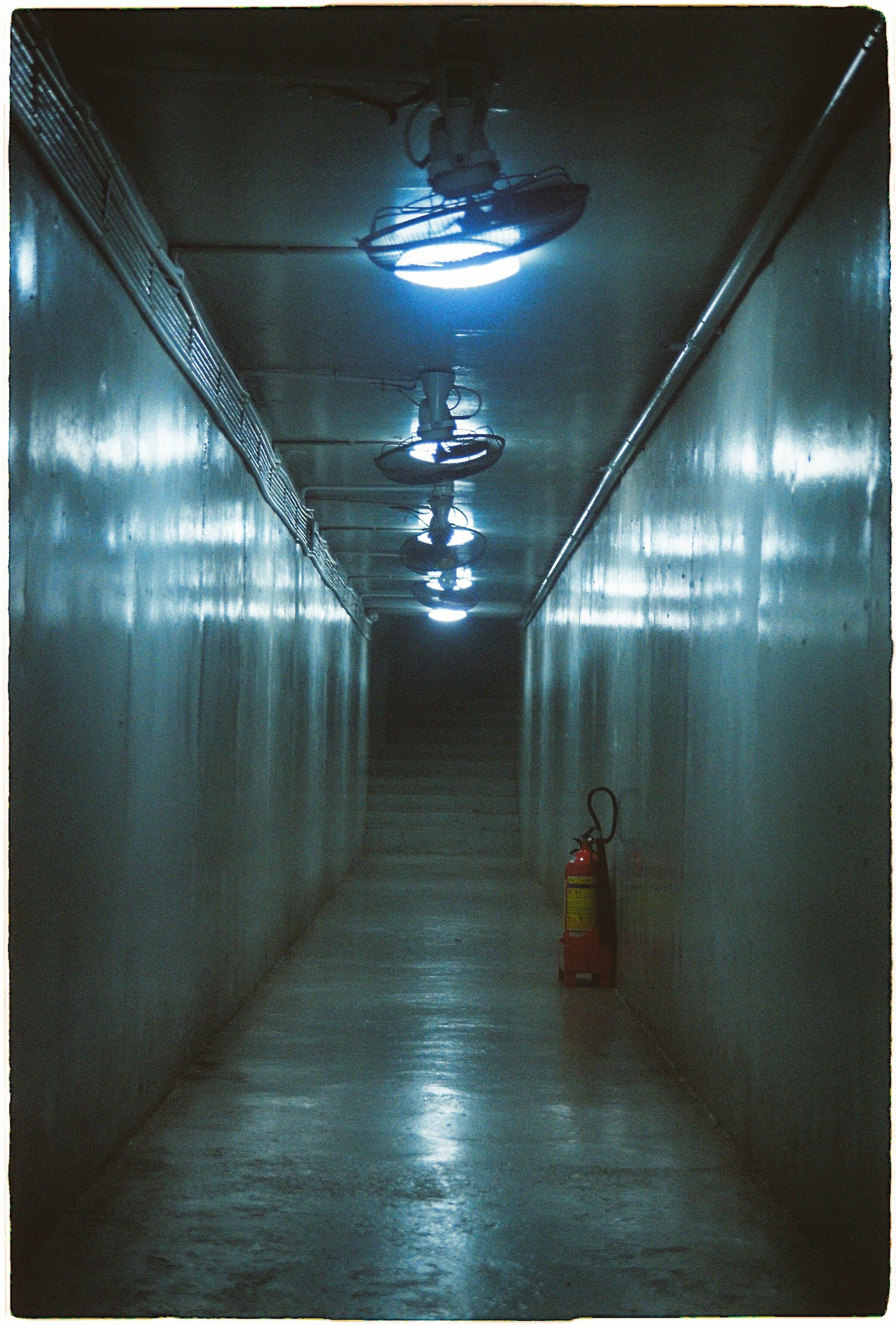 A Fire Extinguisher on the Hallway · Free Stock Photo