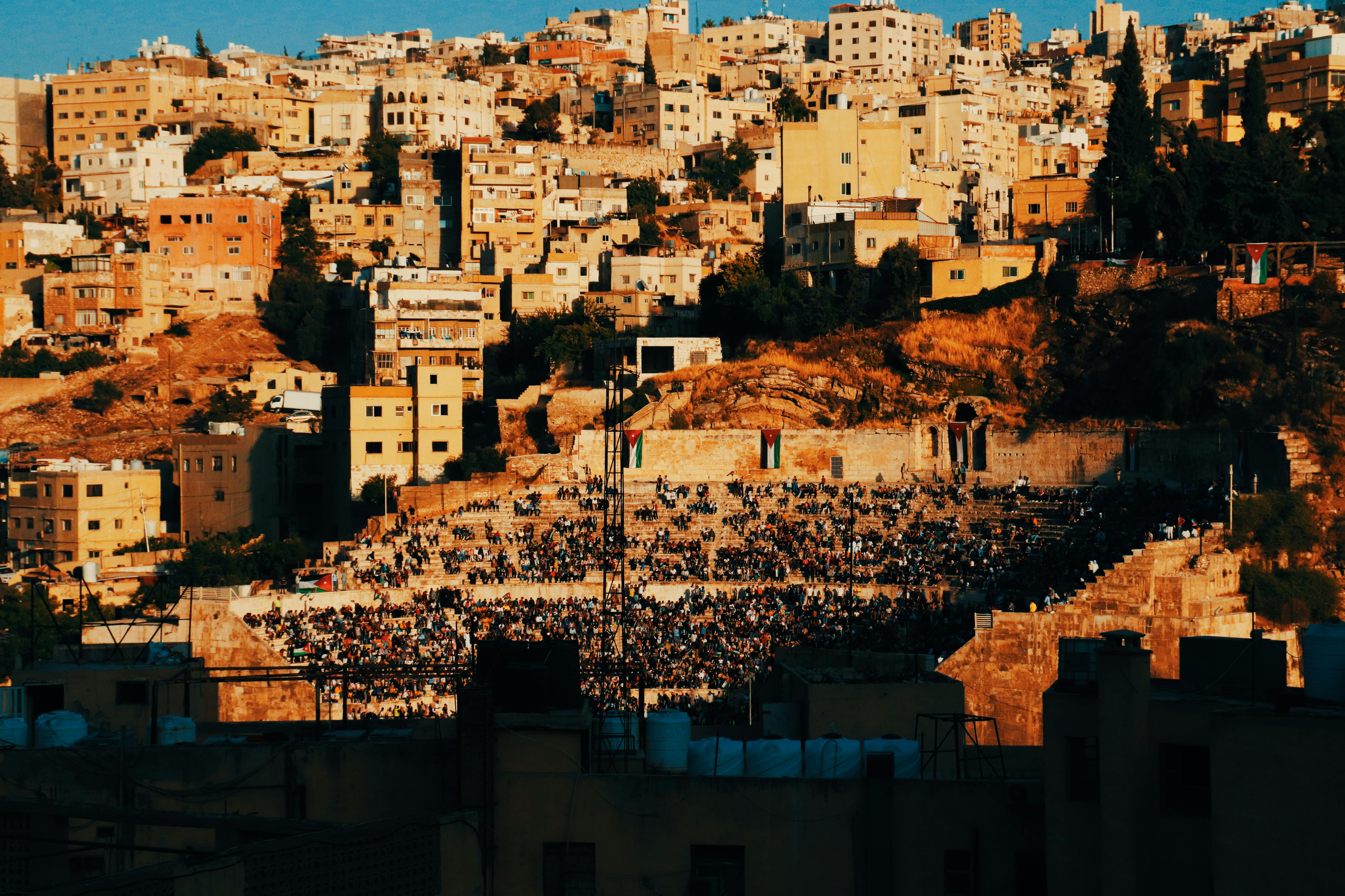 People at the Roman Theatre in Hawari Shar Park · Free Stock Photo