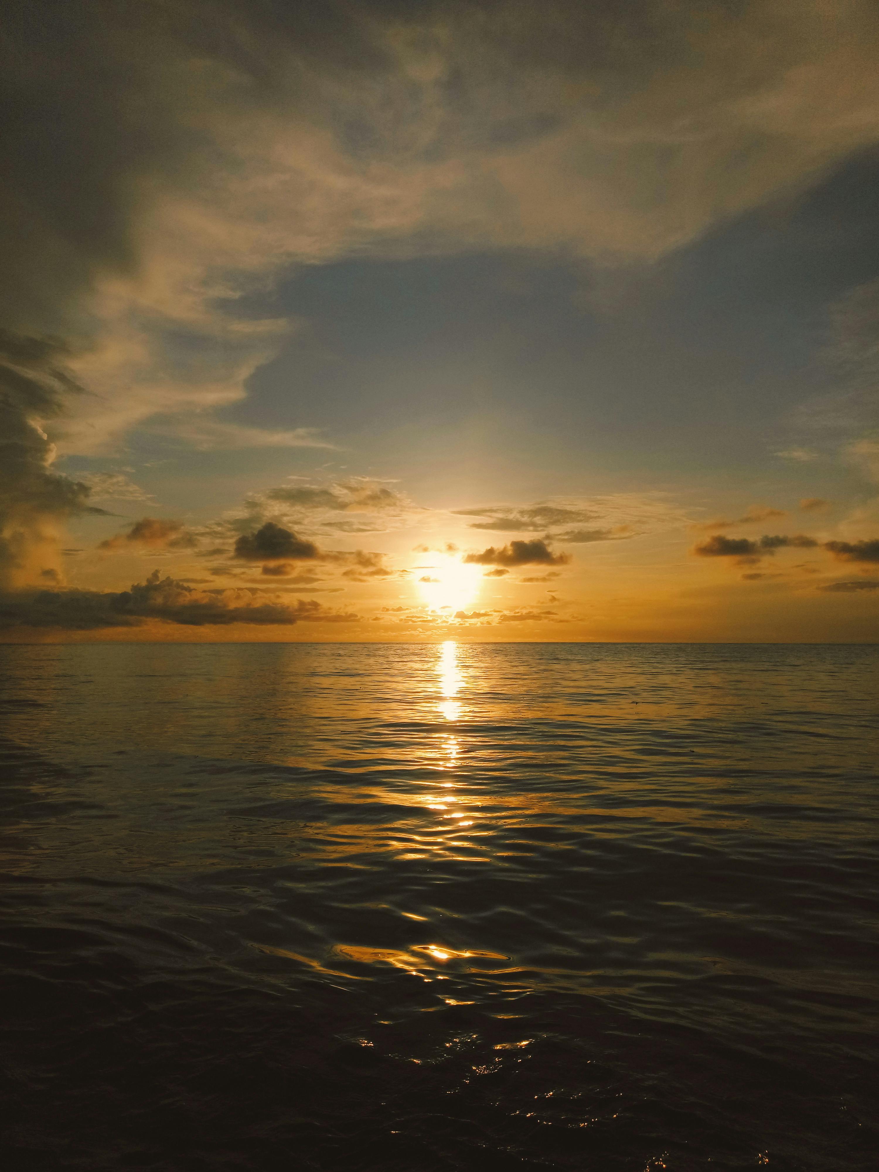 Photo of Sea During Sunset · Free Stock Photo