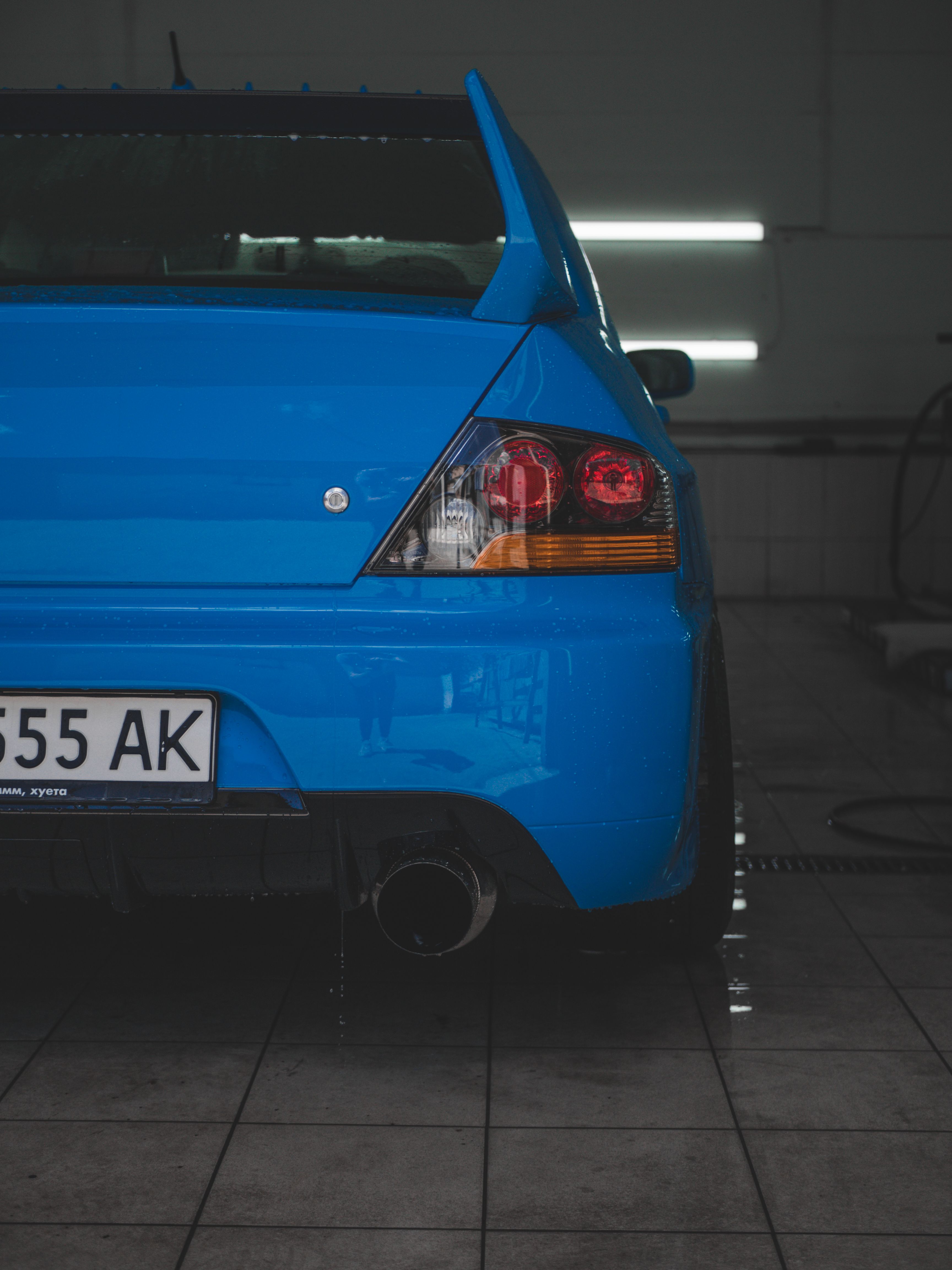 Blue Mitsubishi Lancer Evolution with Black Spoiler · Free Stock Photo