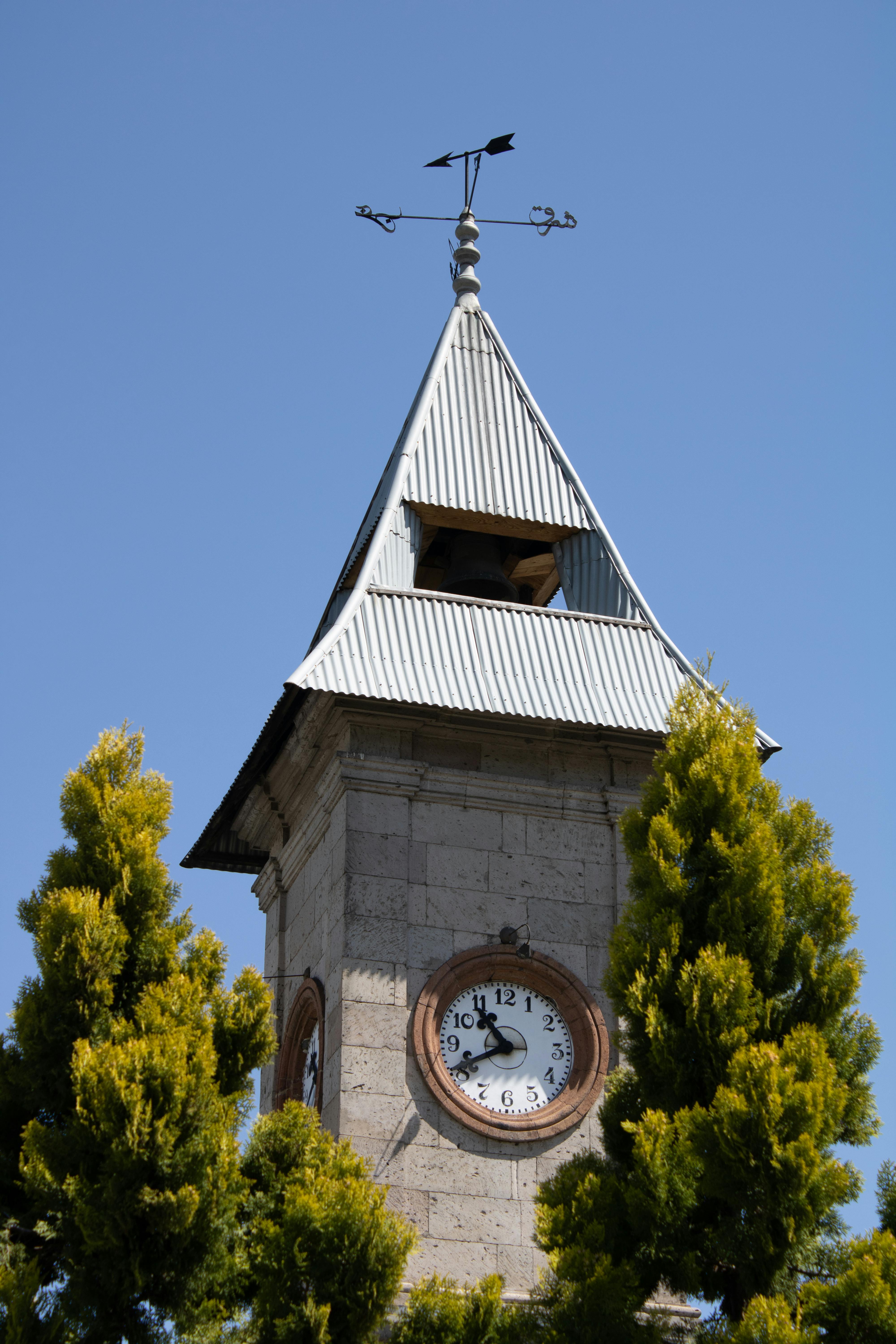 A Concrete Clock Tower · Free Stock Photo