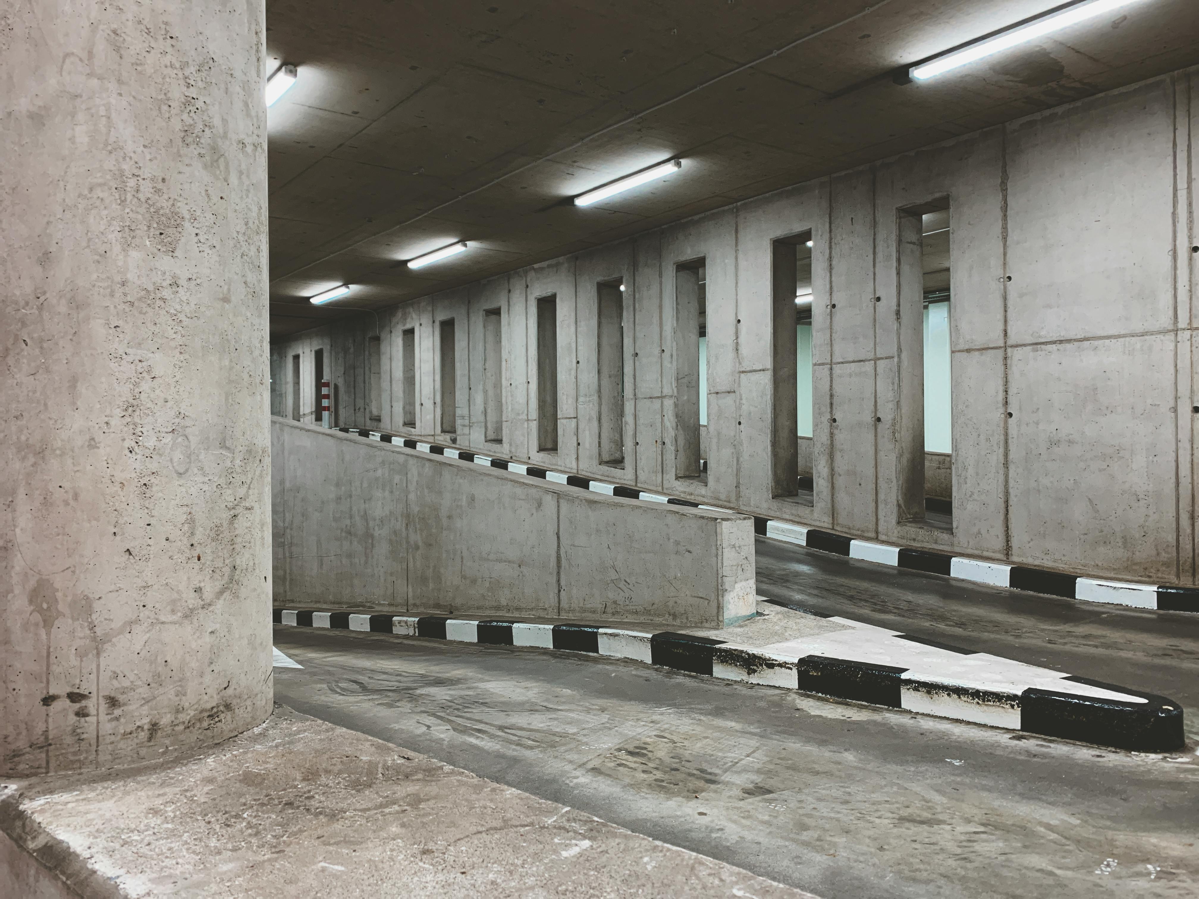 An Inclined Road Beside Apartment Buildings · Free Stock Photo