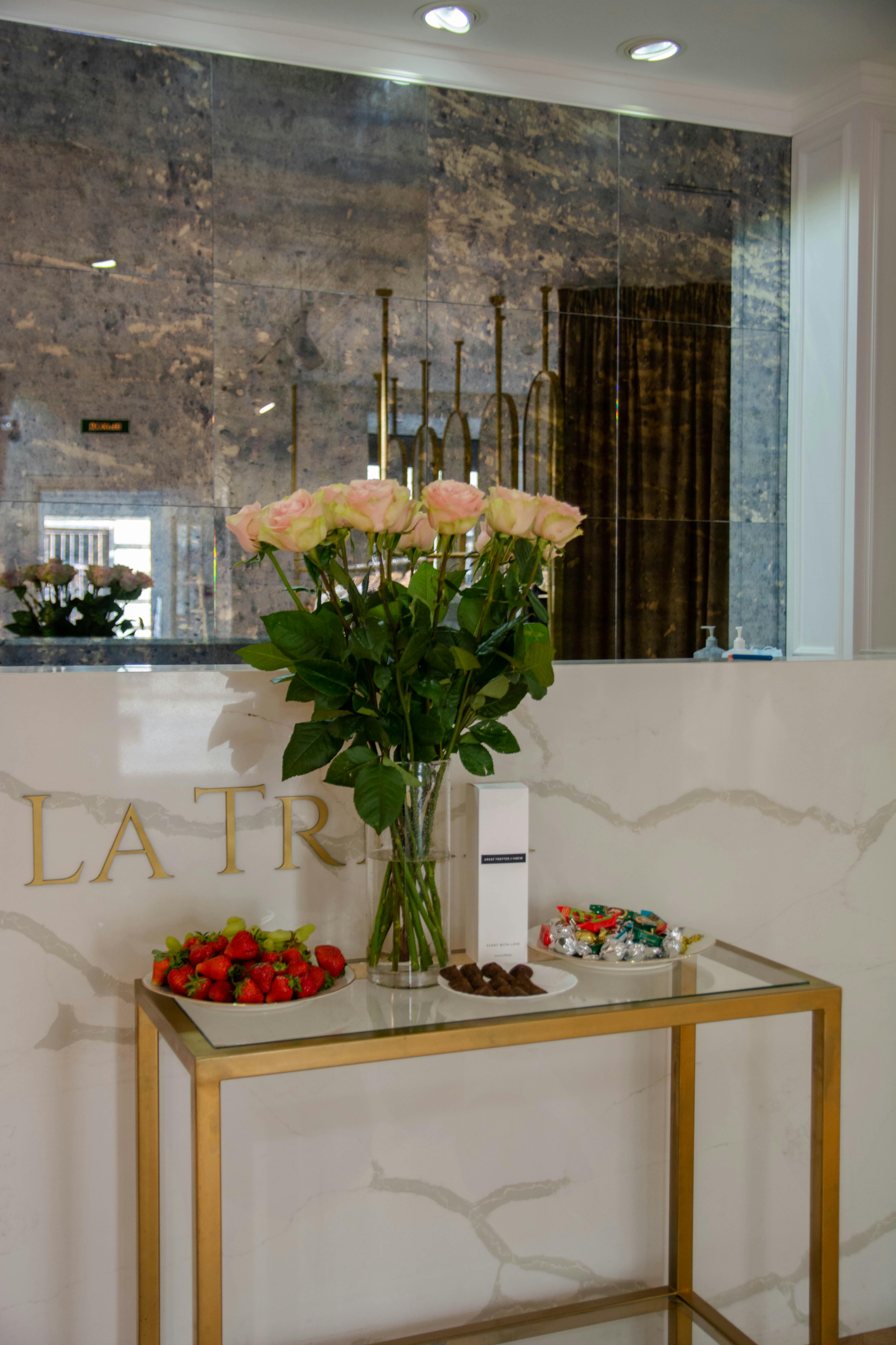 Glass Table with Flowers and Snacks in Hotels Reception Desk · Free ...