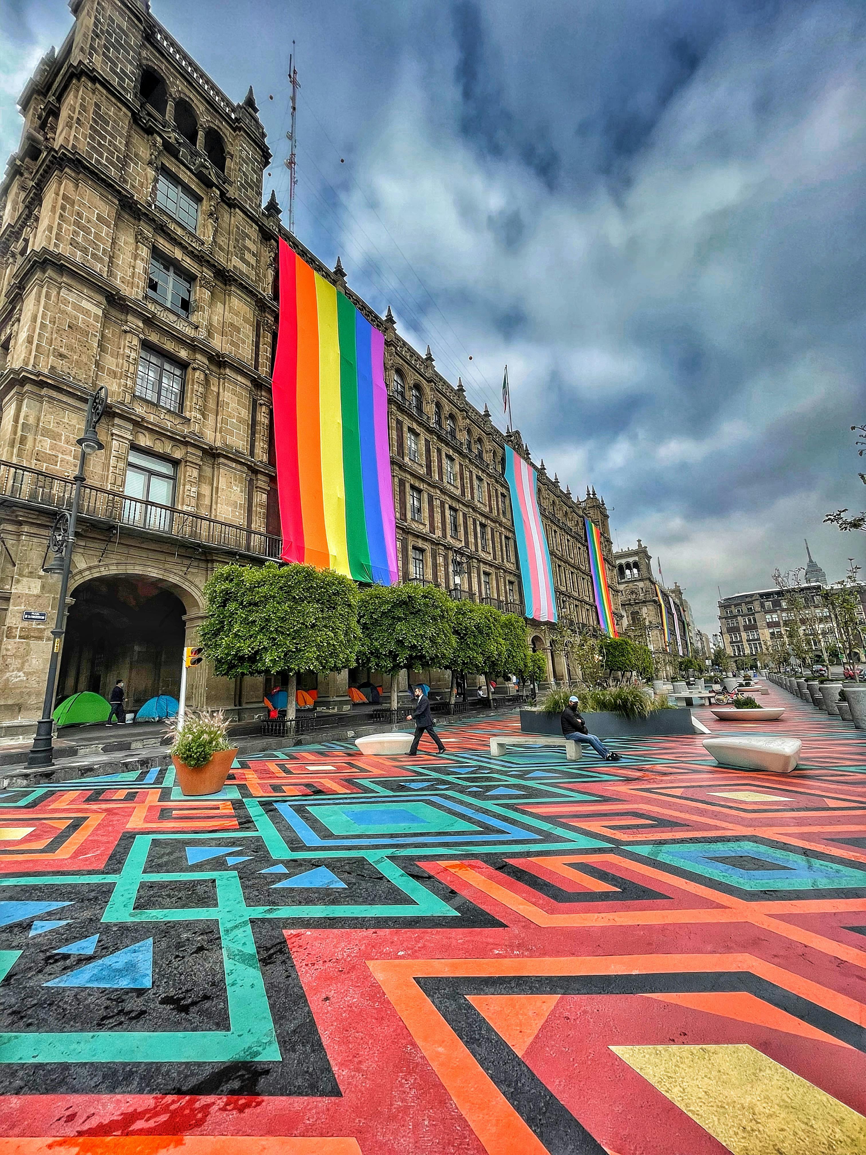 Colorful Flags on a Building · Free Stock Photo