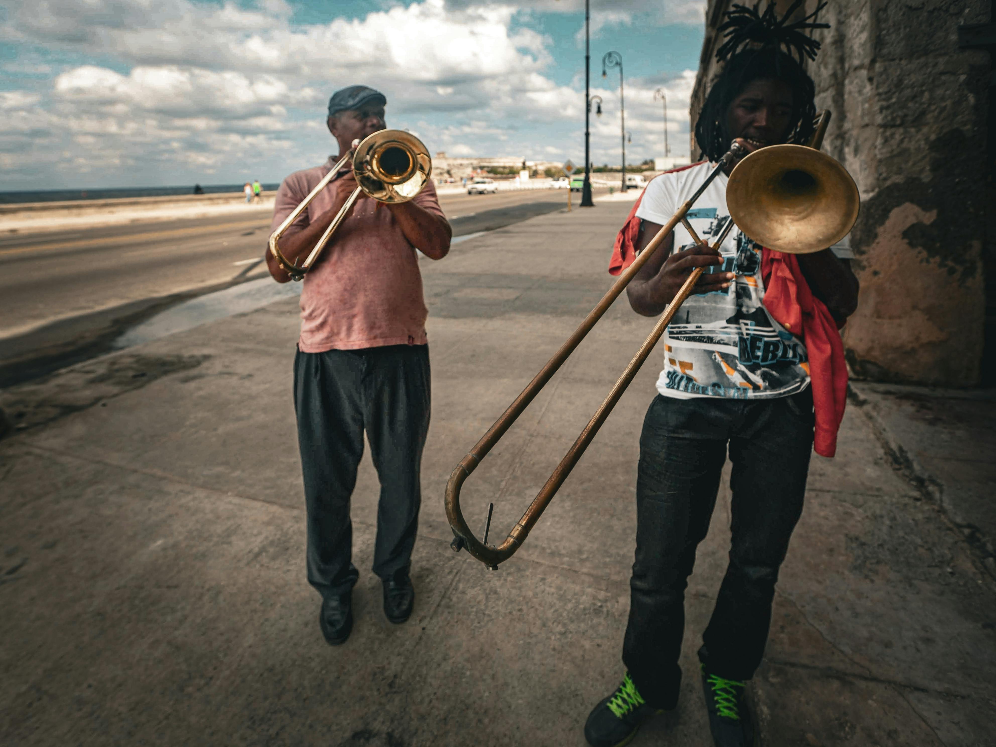 Men Playing Trumpets on the Street · Free Stock Photo