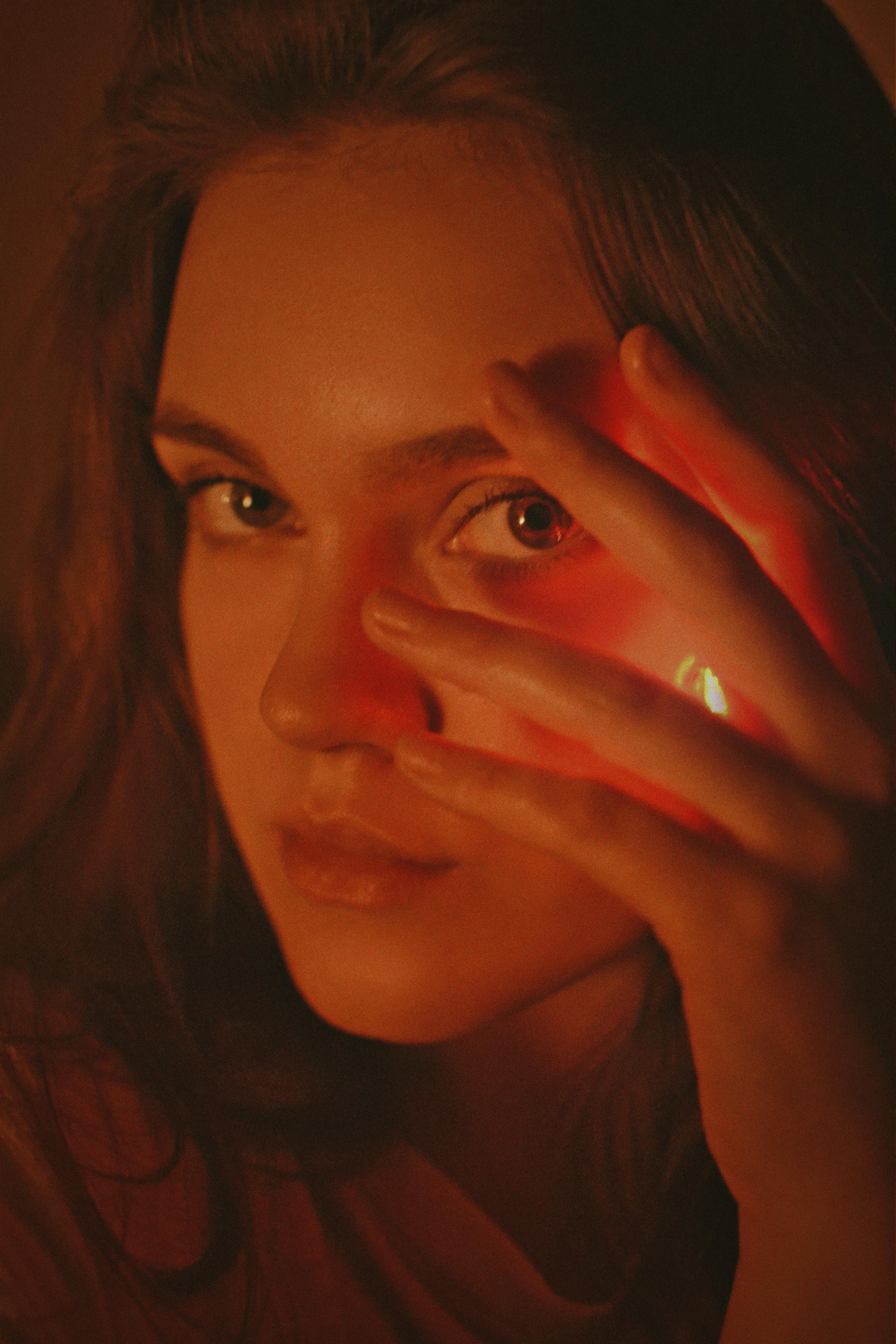 Close-up Photo of Woman in Floral Sheer Top · Free Stock Photo