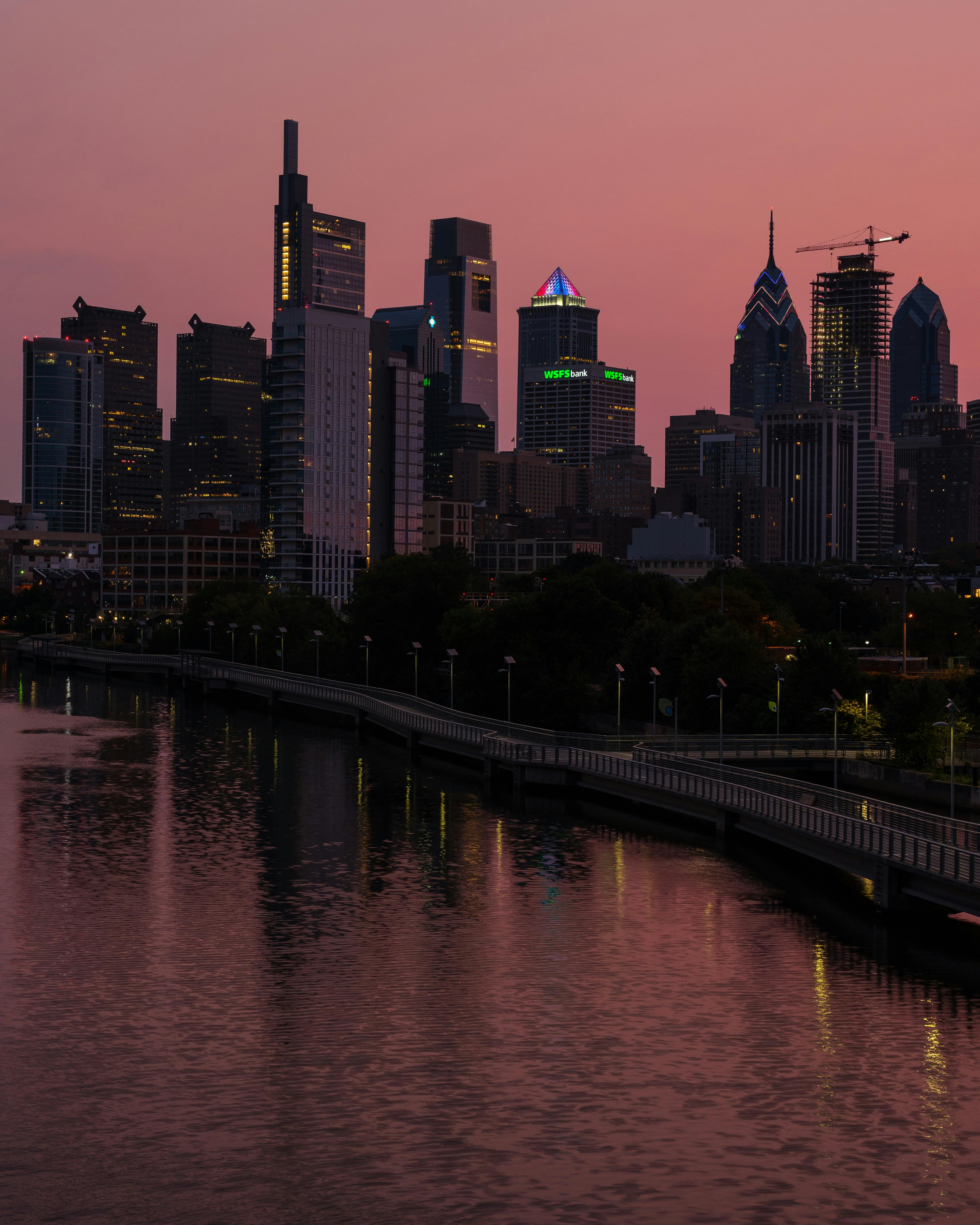 City Skyline across Body of Water · Free Stock Photo