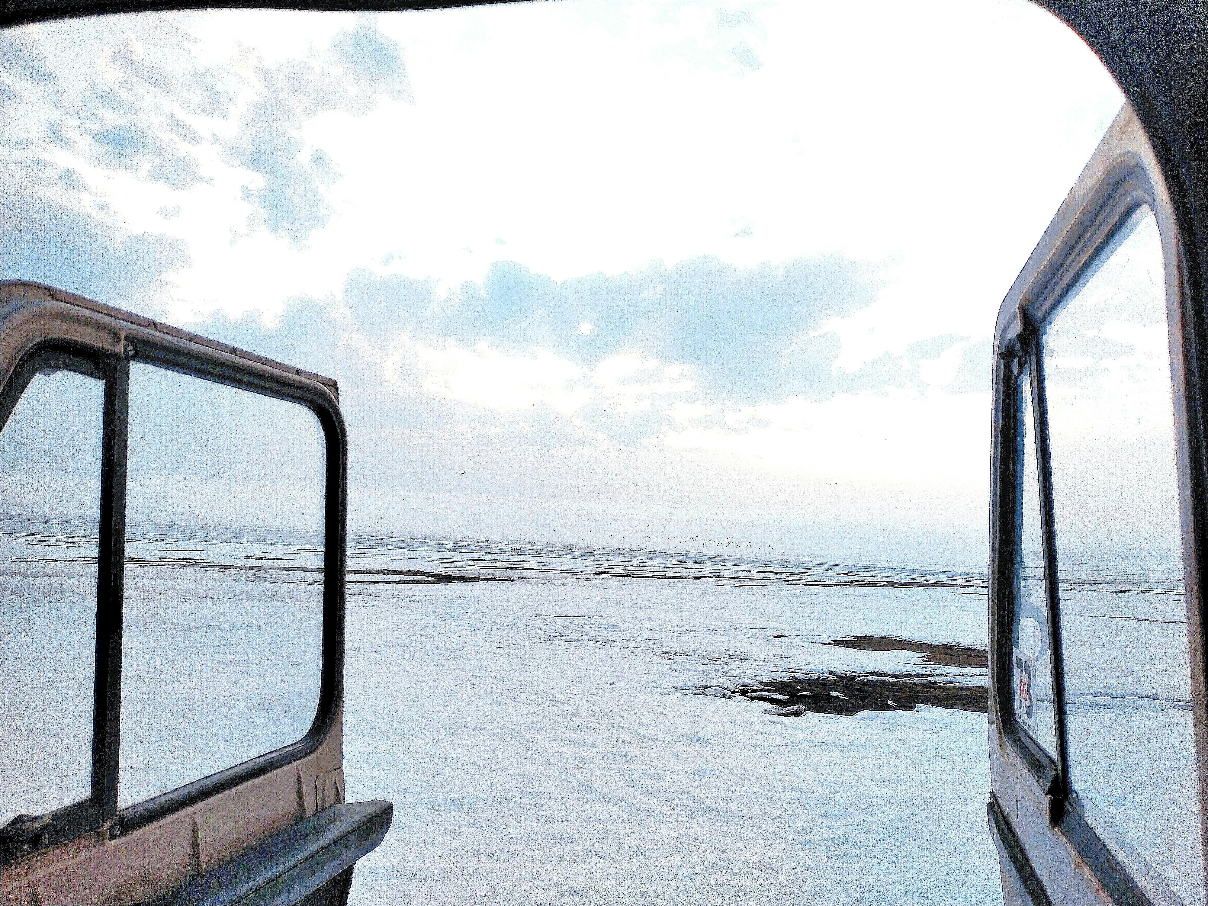 Snow Covered Shore of a Sea · Free Stock Photo