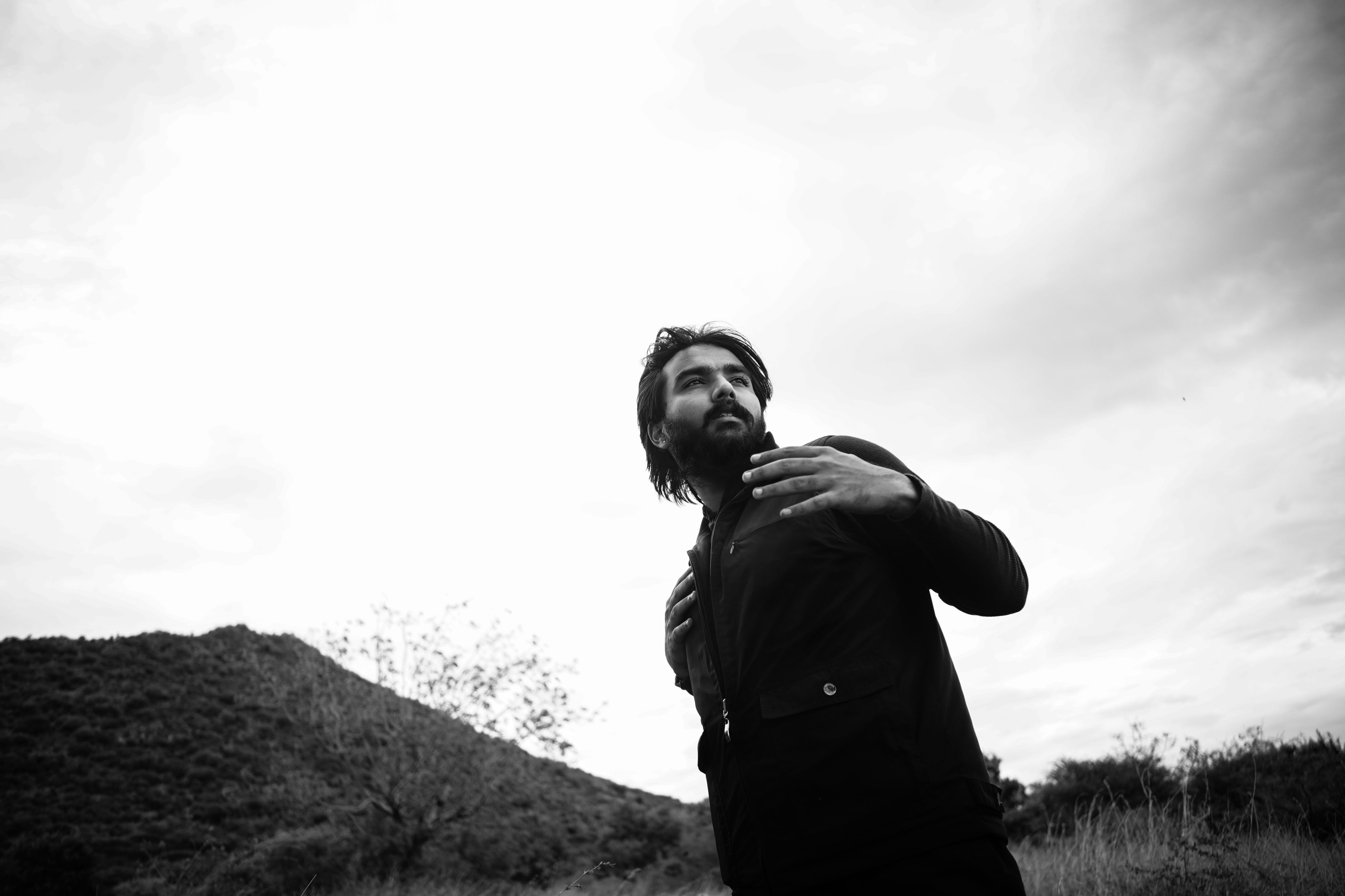 Low Angle Shot of Man in Black Jacket · Free Stock Photo