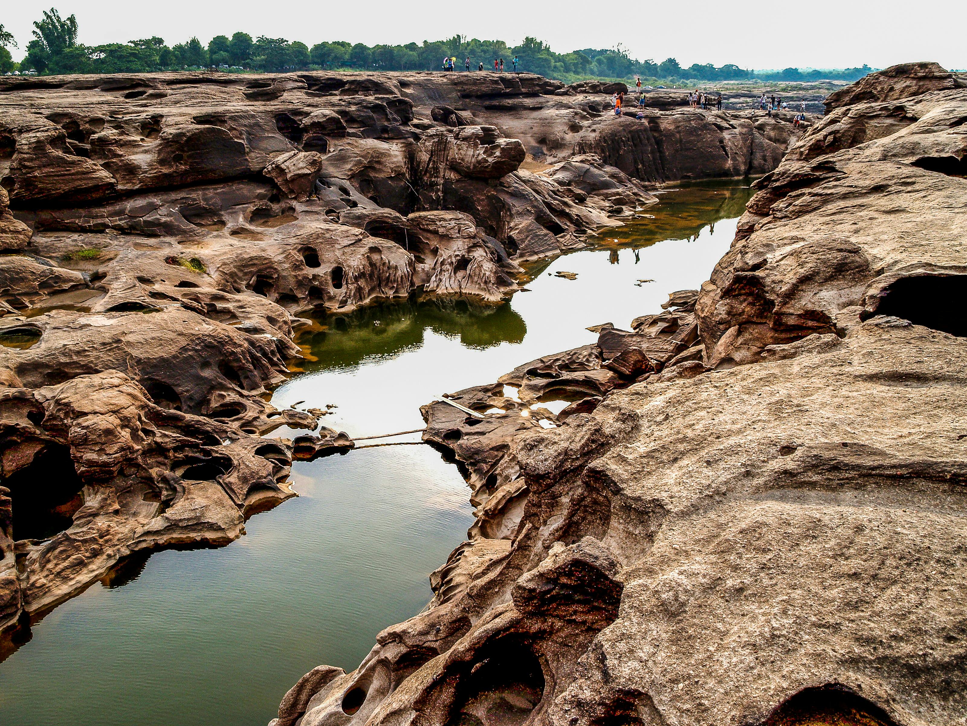 Body of Water in Between Rock Formation · Free Stock Photo