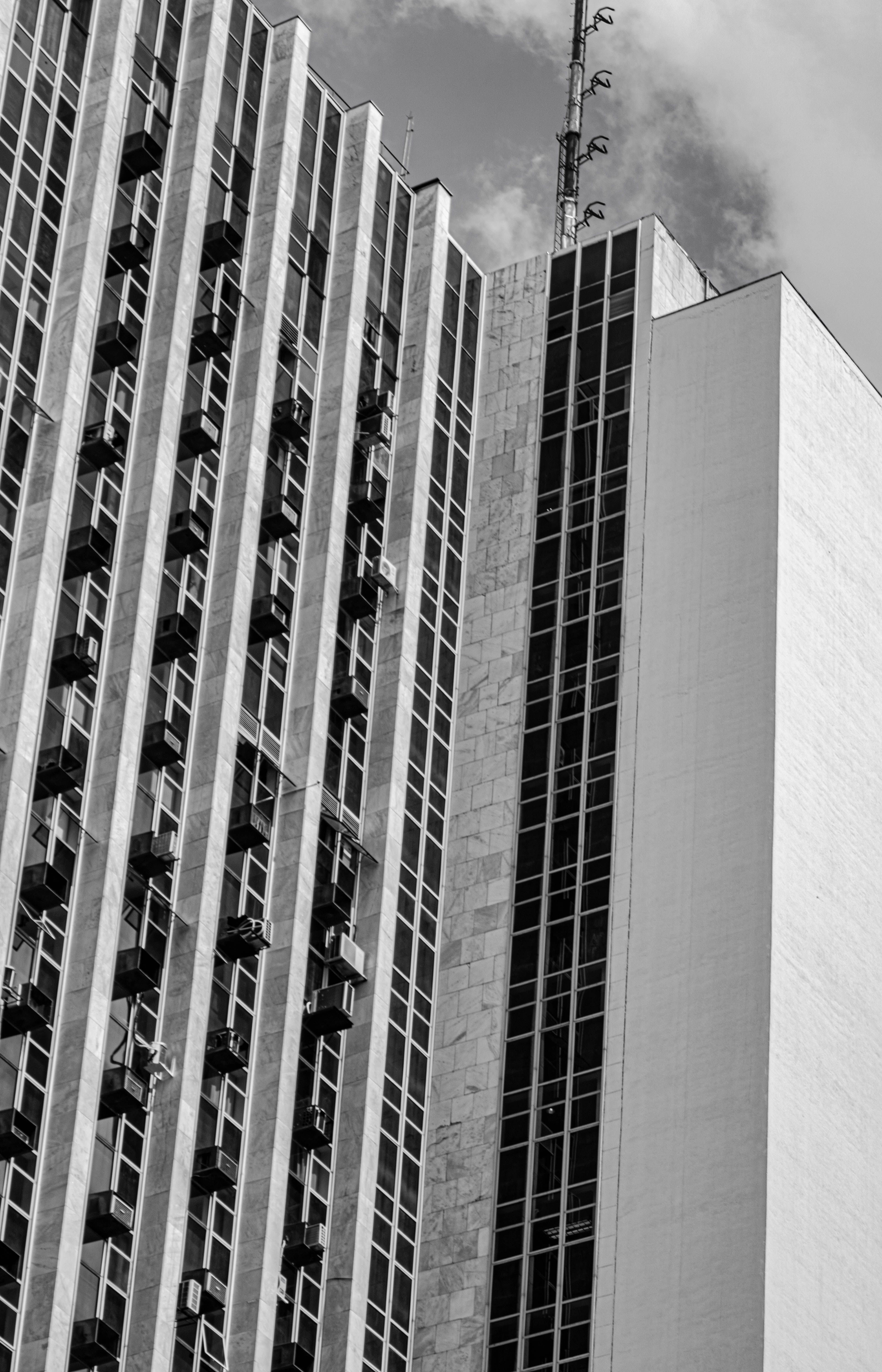 Grayscale Photo of Chain Link Fence Near Concrete Building · Free Stock ...