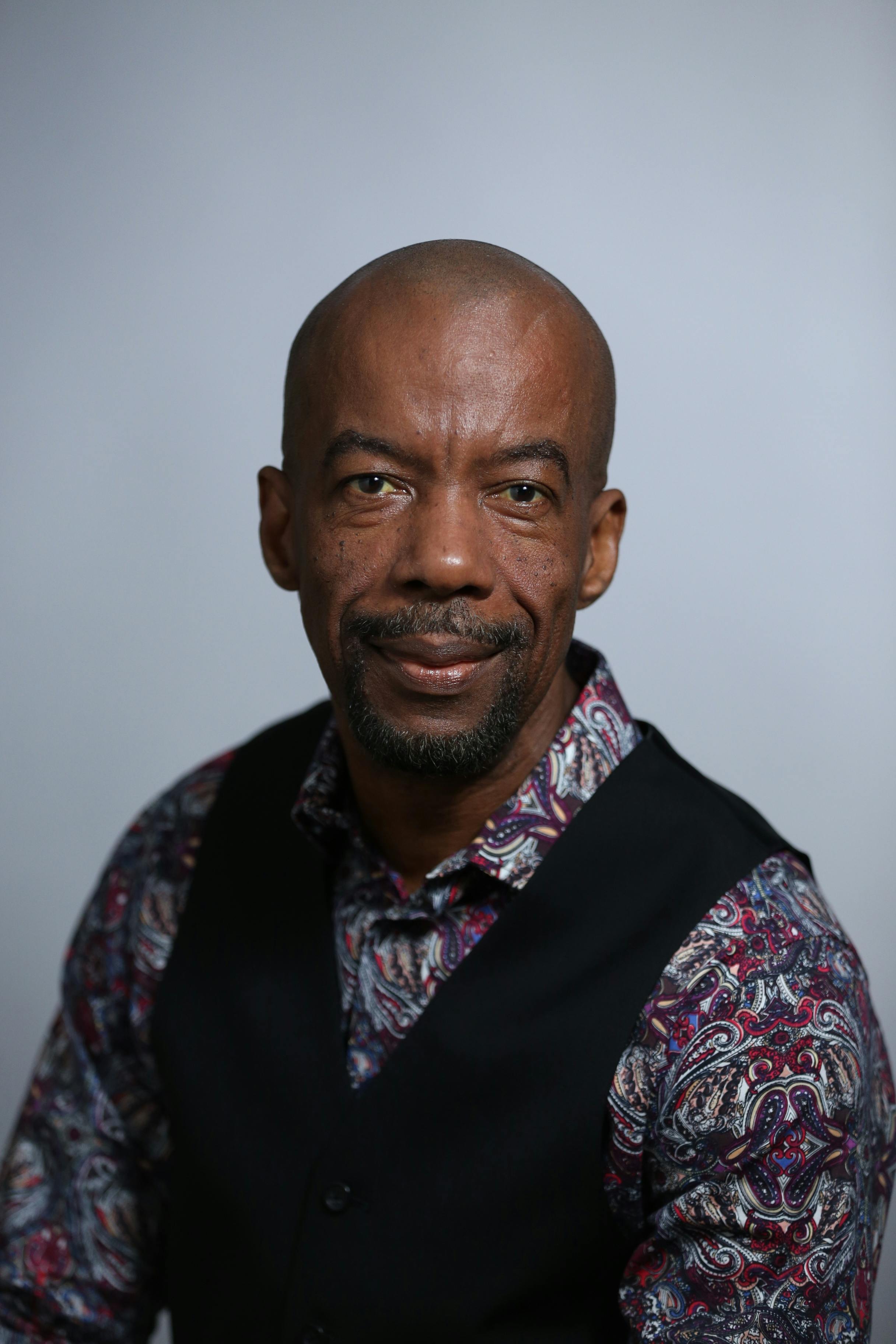 Portrait of a Man in a Black Vest · Free Stock Photo
