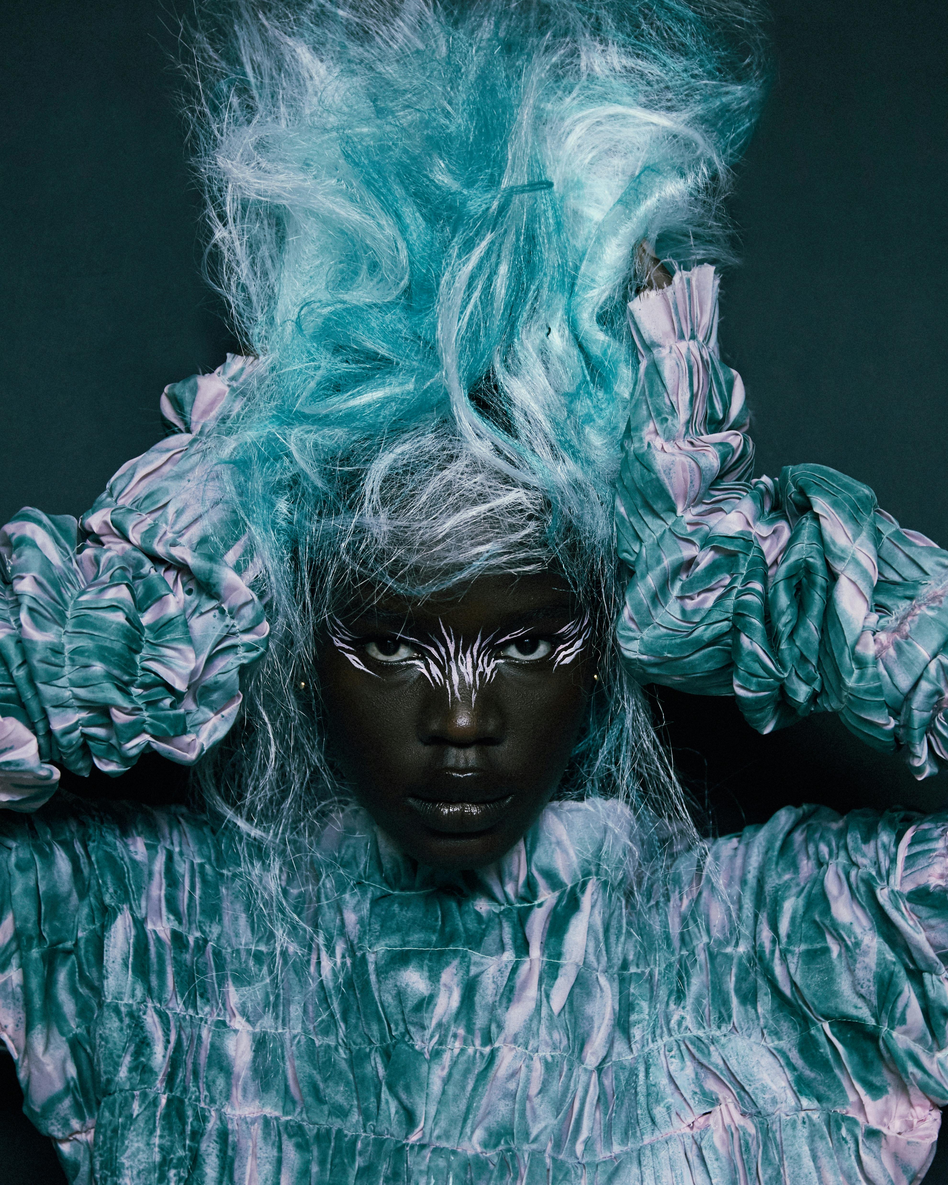 Woman Wearing an Icy Blue Costume, Makeup and Wig · Free Stock Photo