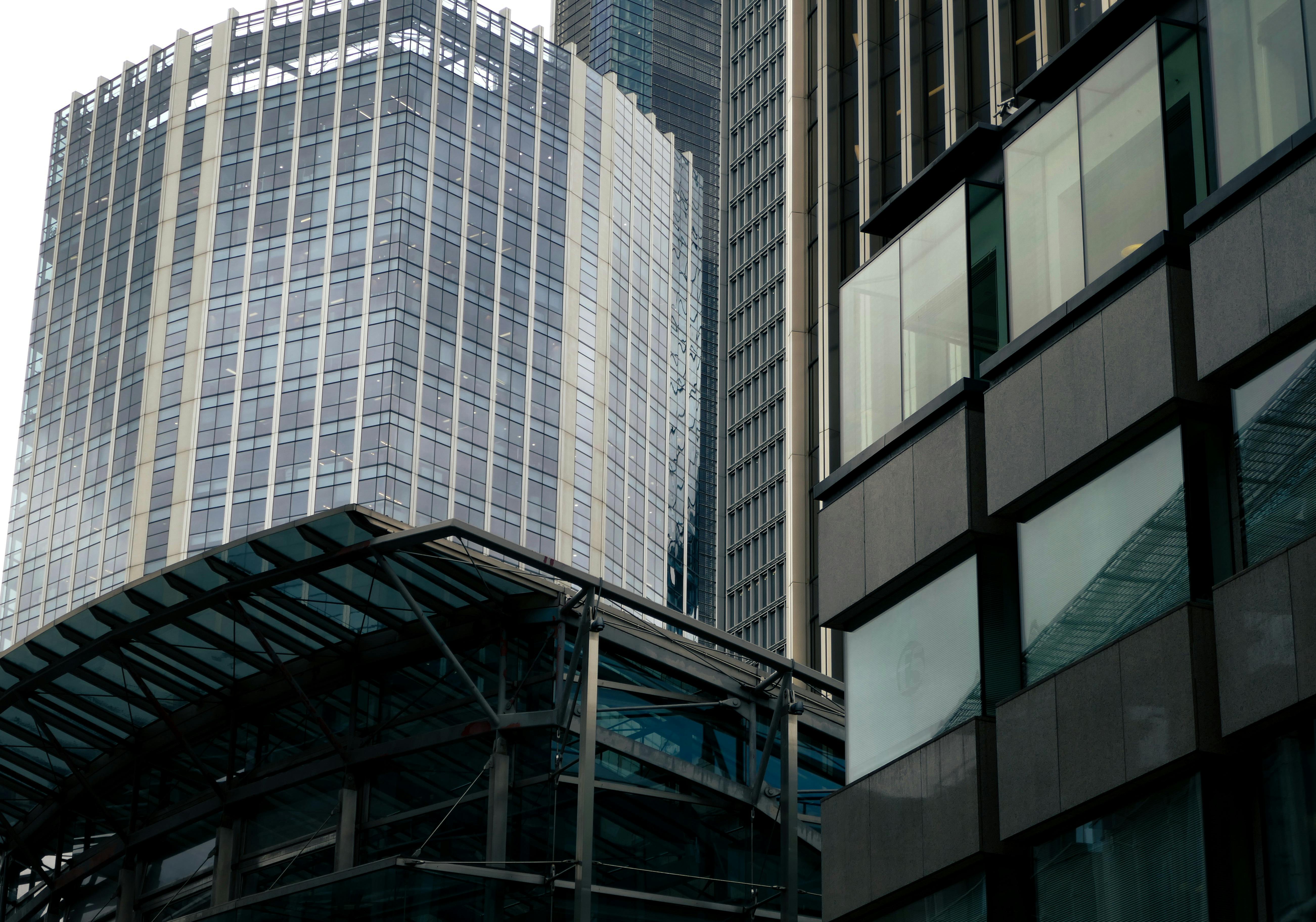 Blue Glass High-rise Buildings · Free Stock Photo