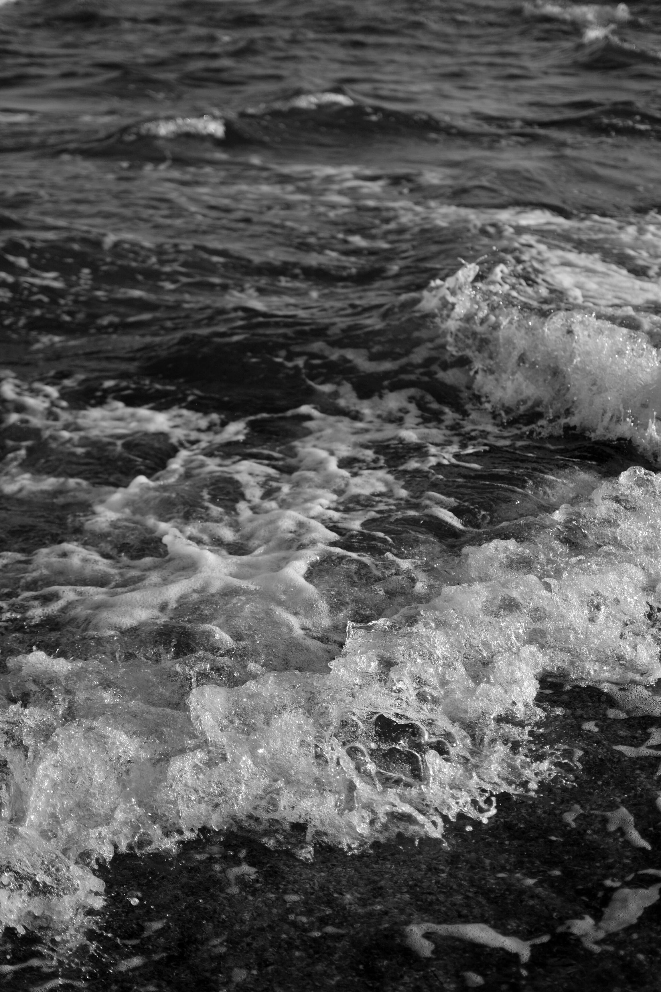 Grayscale Photo of Ocean Waves · Free Stock Photo