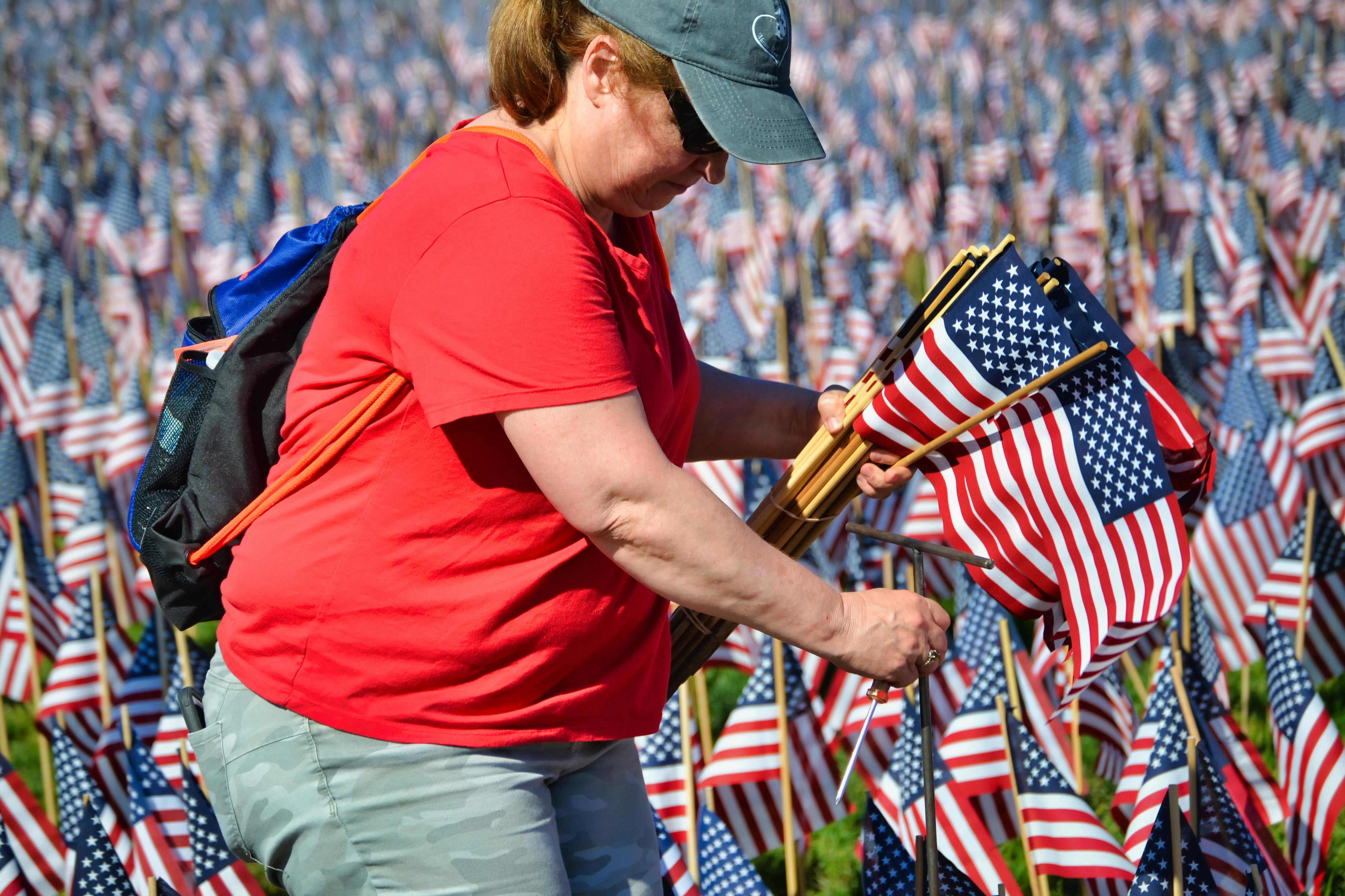 A Kid Holding a Flag · Free Stock Photo