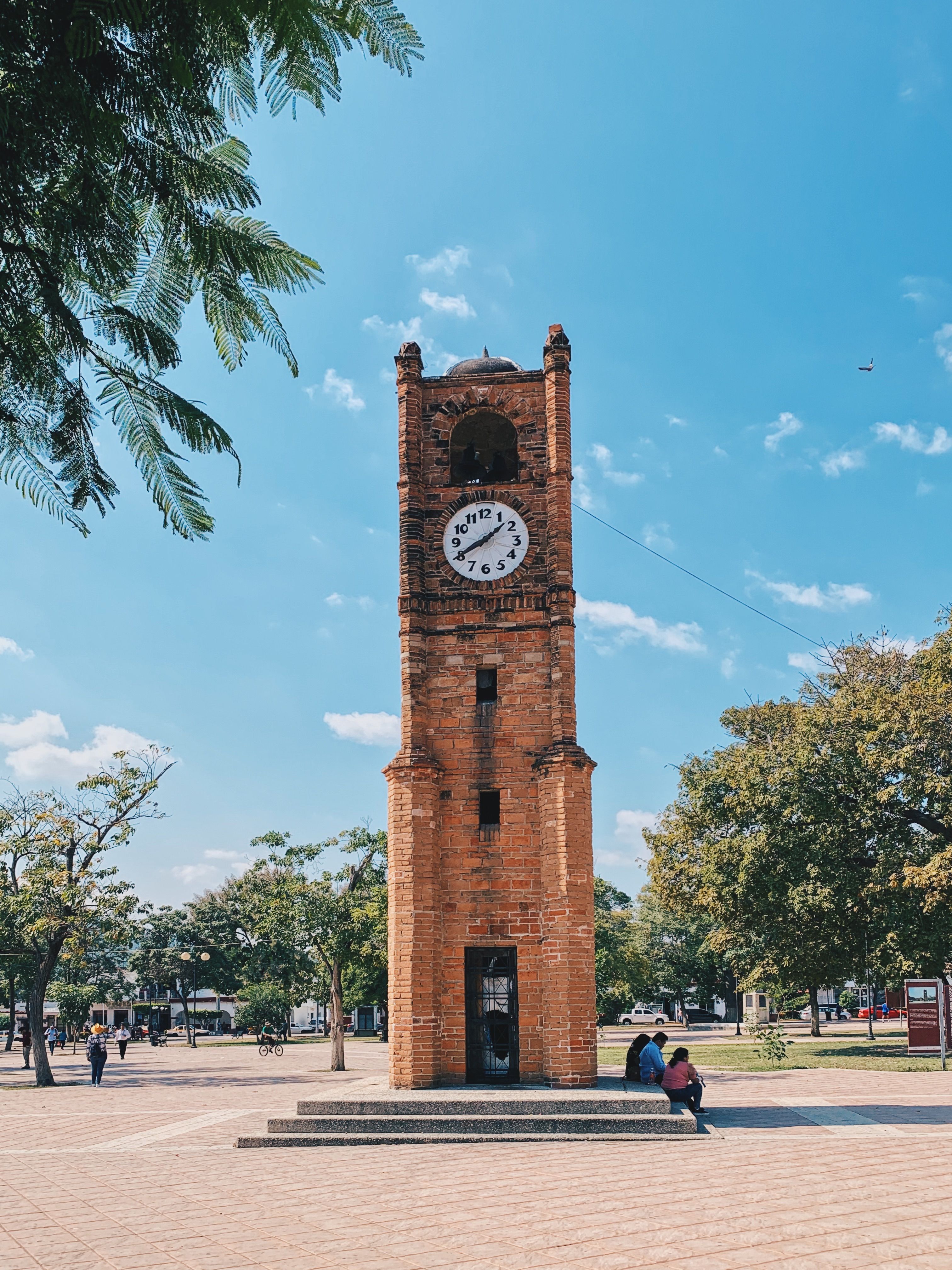 Brown Concrete Clock Tower Under the Blue Sky · Free Stock Photo