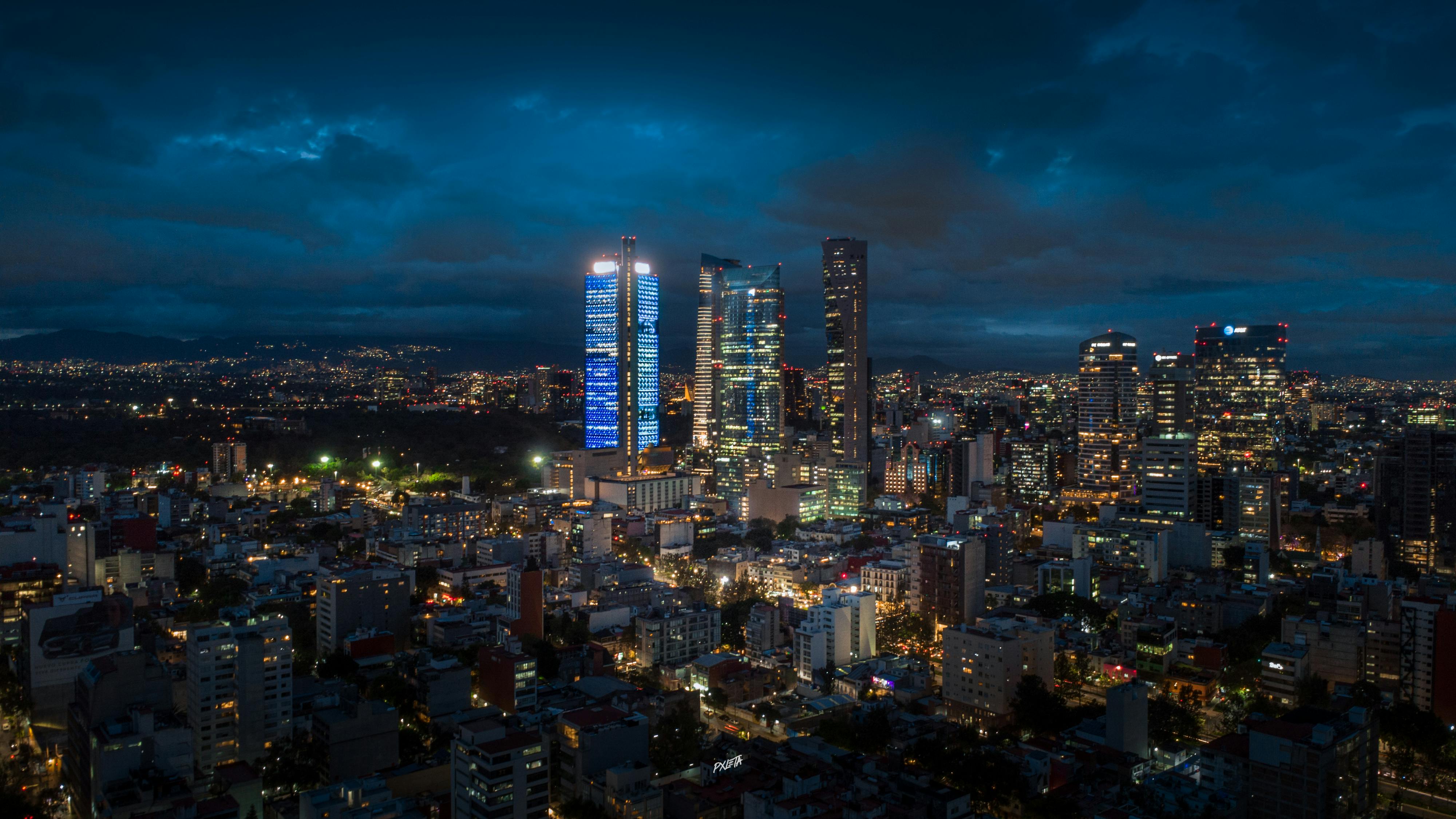 Aerial View of City Buildings during Night Time · Free Stock Photo