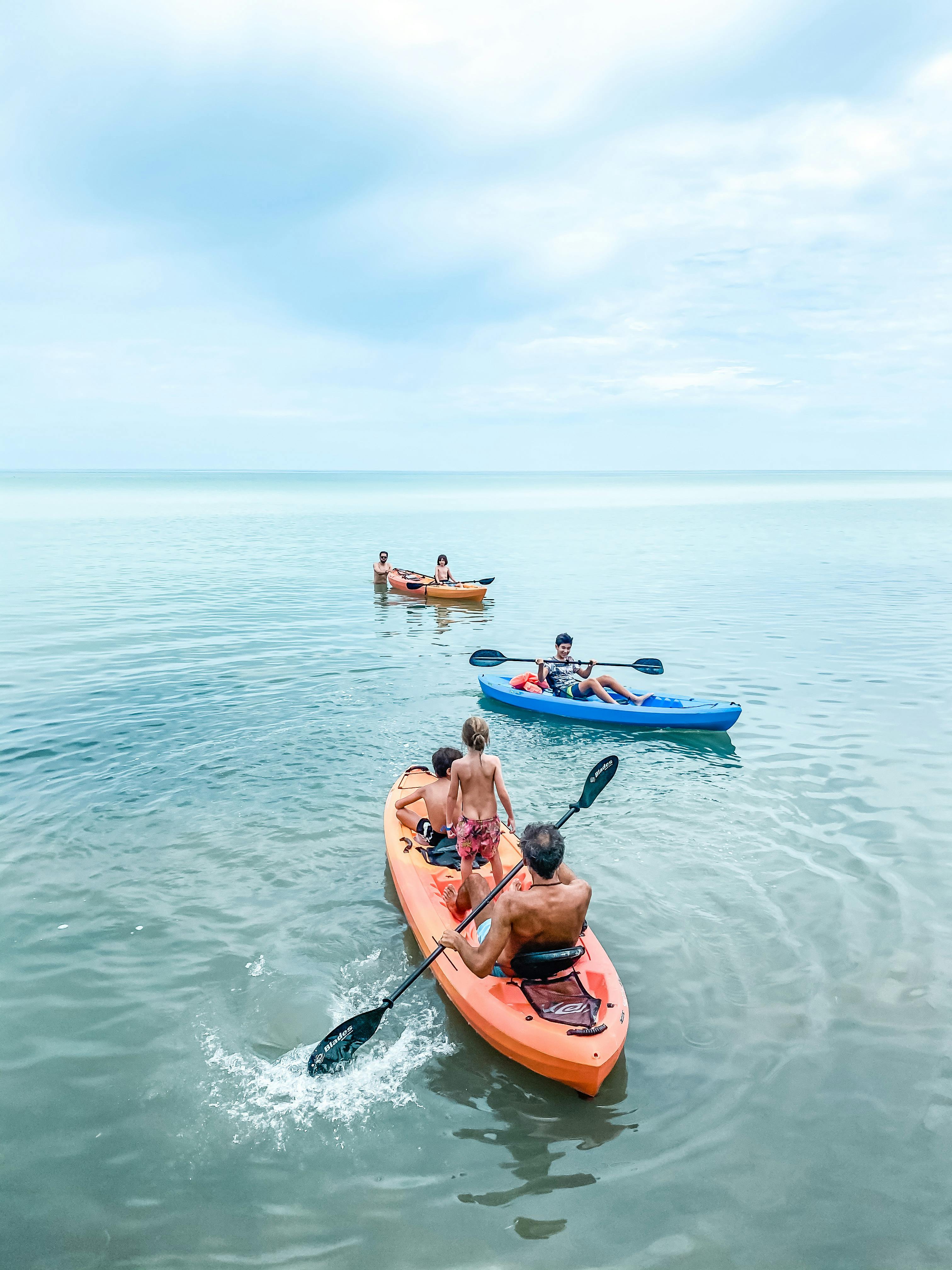 People Canoeing in the Sea · Free Stock Photo