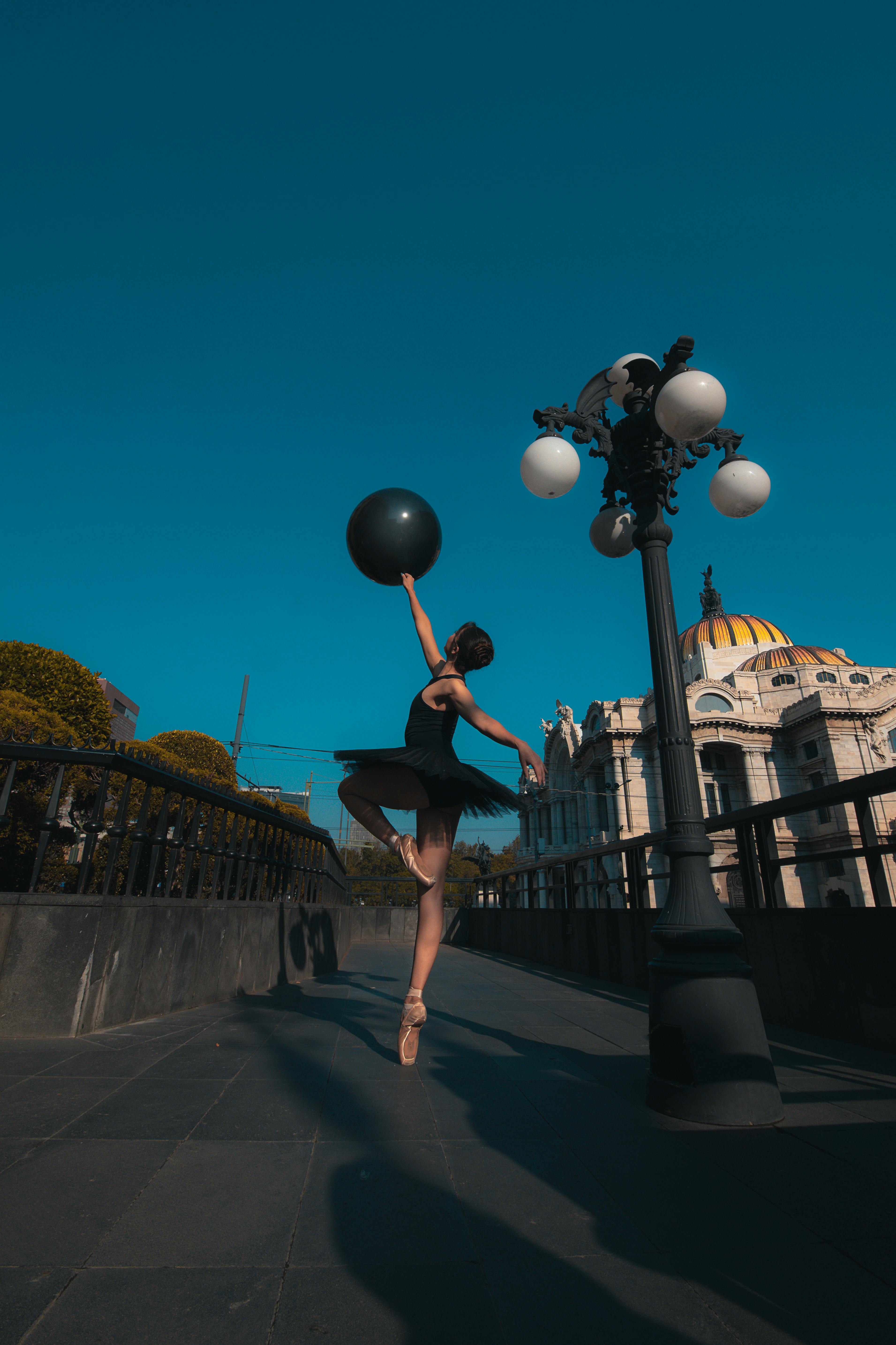 Low Angle Shot of Ballerina Dancer · Free Stock Photo