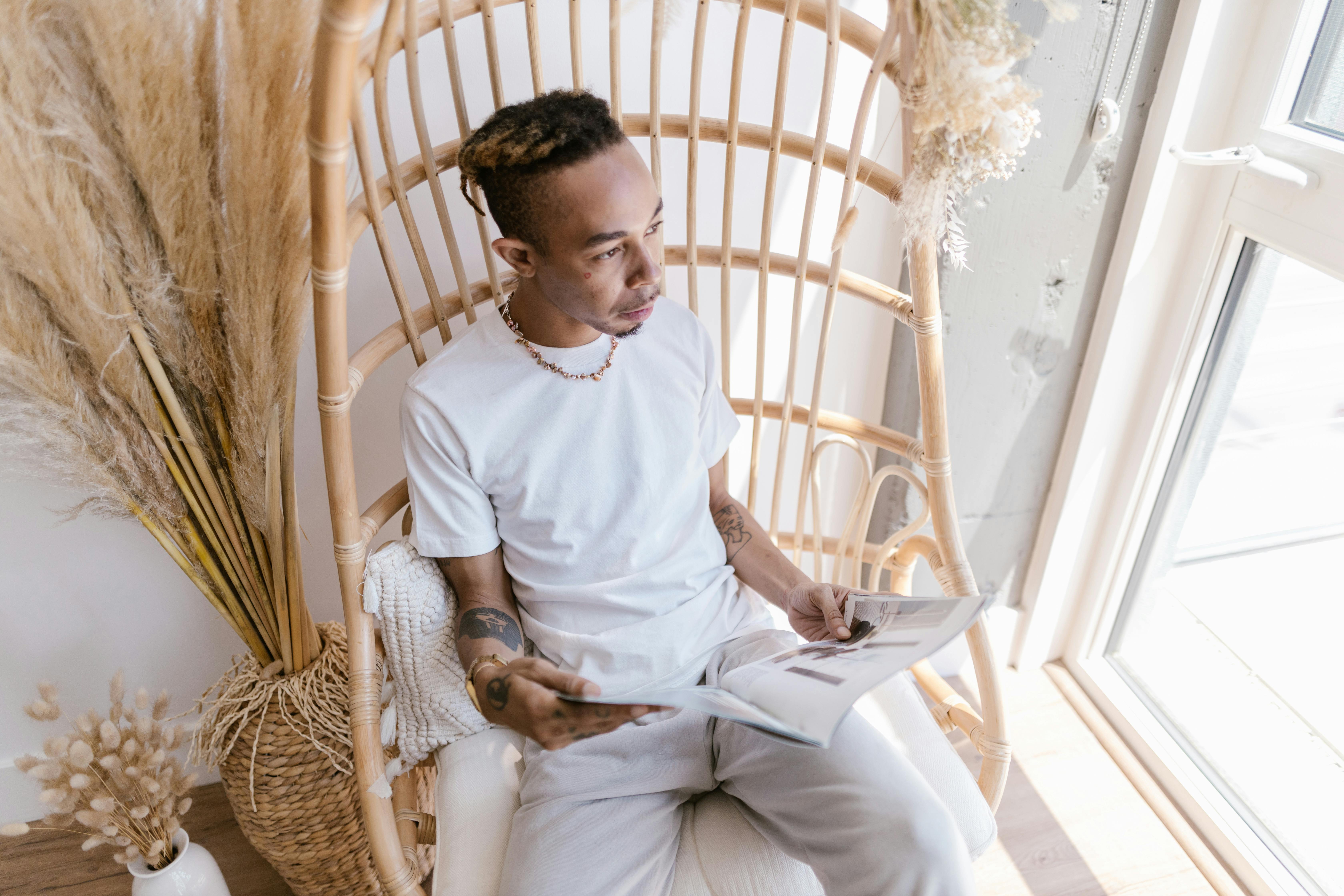 Smiling Man Reading · Free Stock Photo