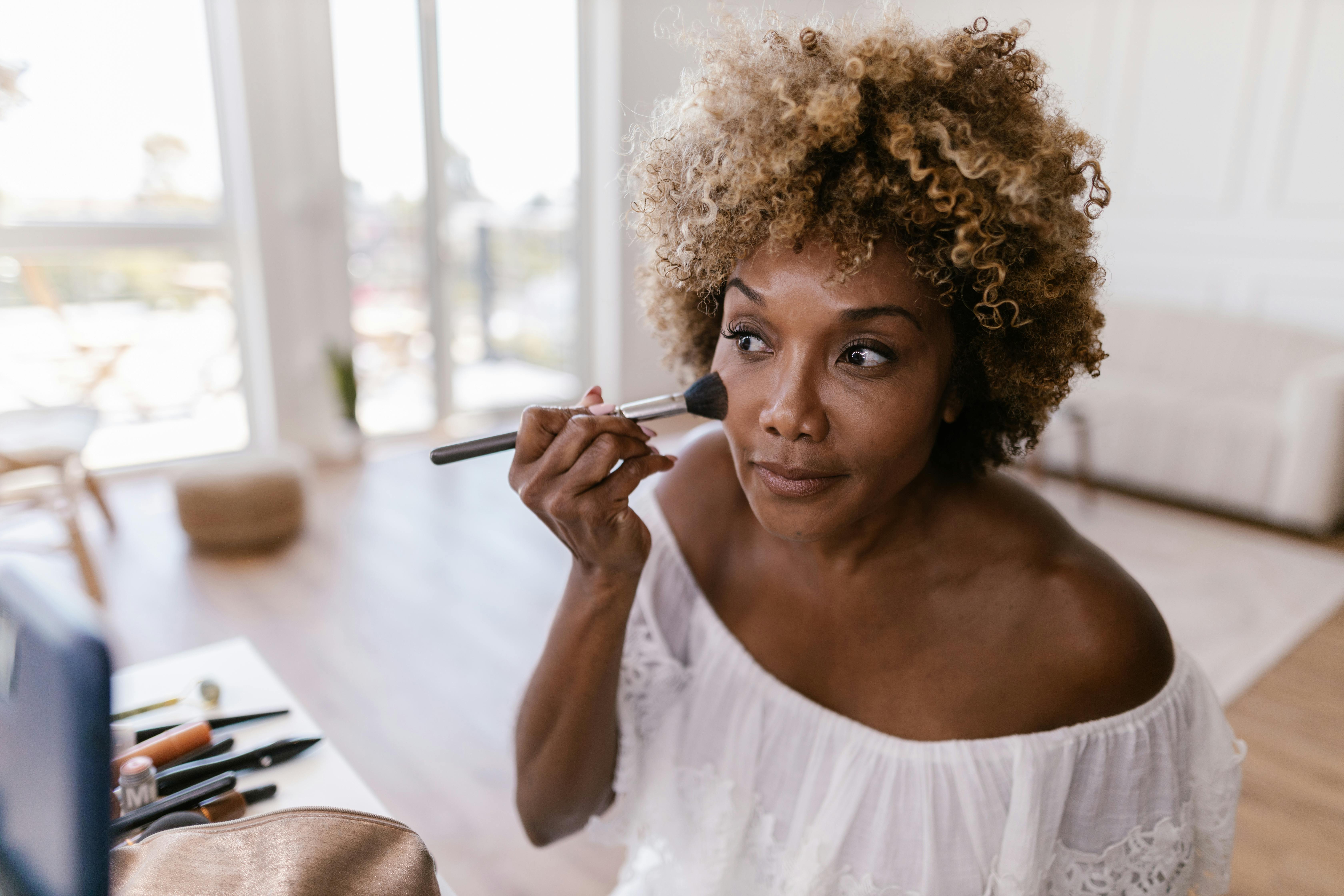 Woman Doing Her Makeup · Free Stock Photo