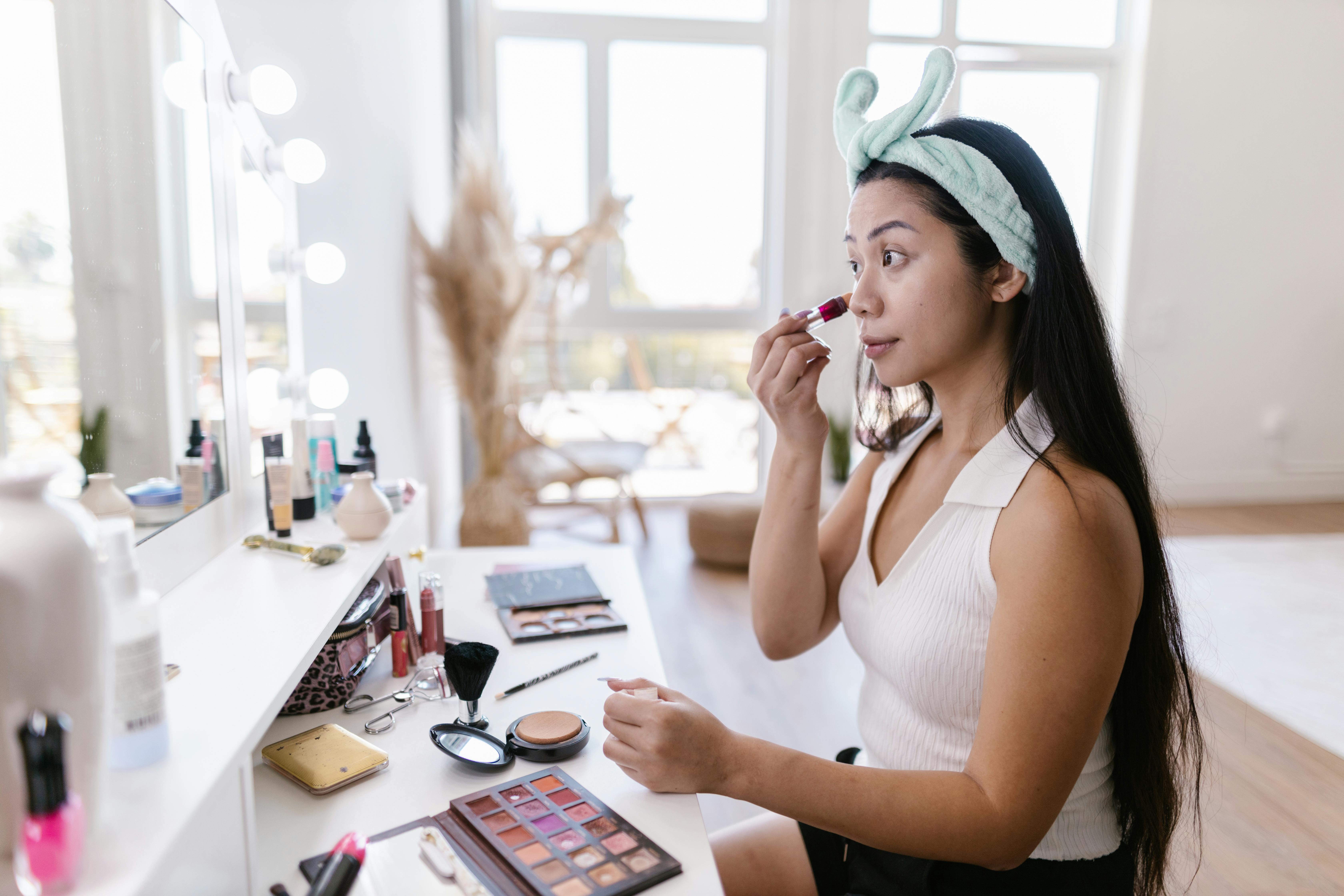 Woman Doing Makeup · Free Stock Photo