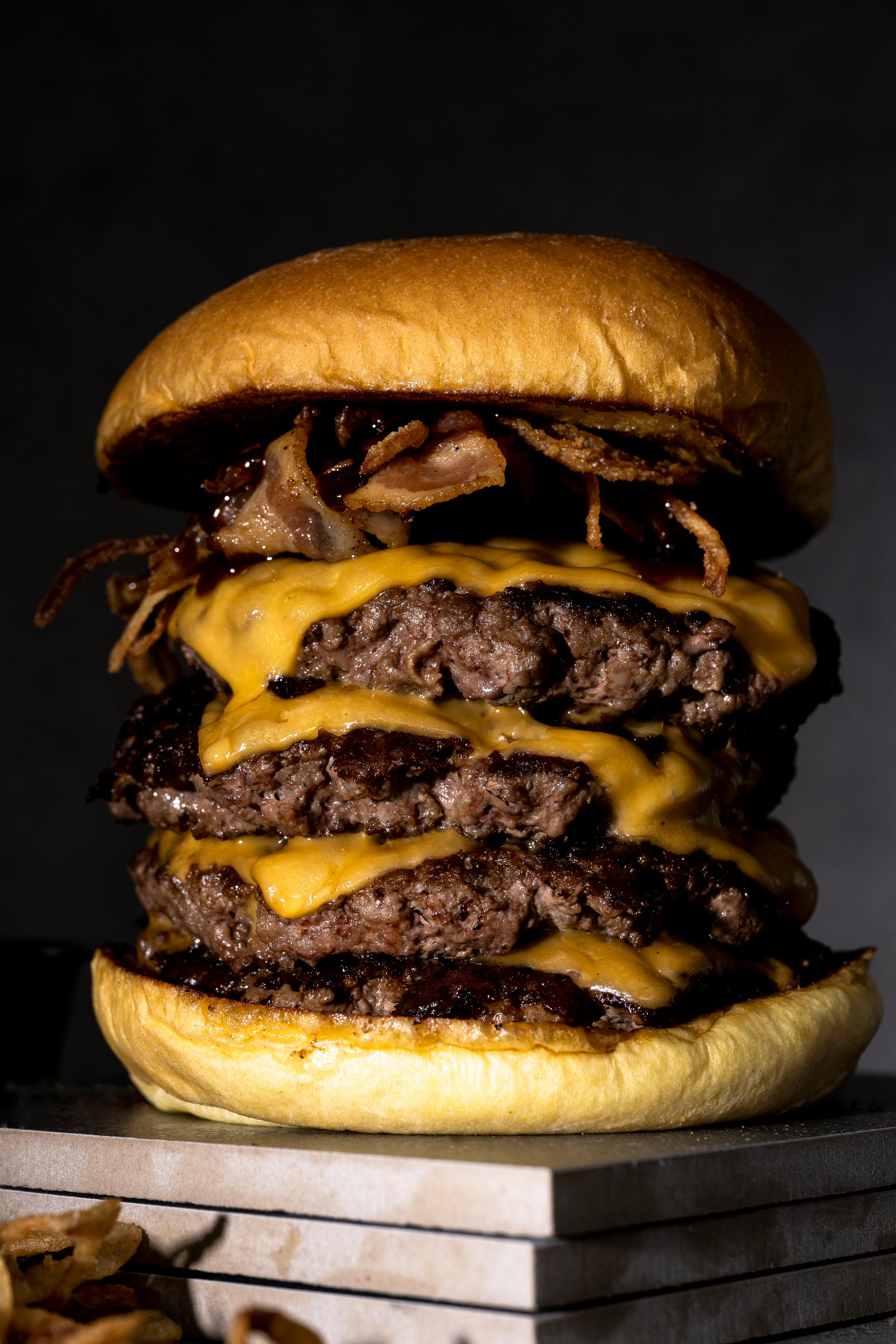 Close up of a Multi-Layered Cheeseburger · Free Stock Photo