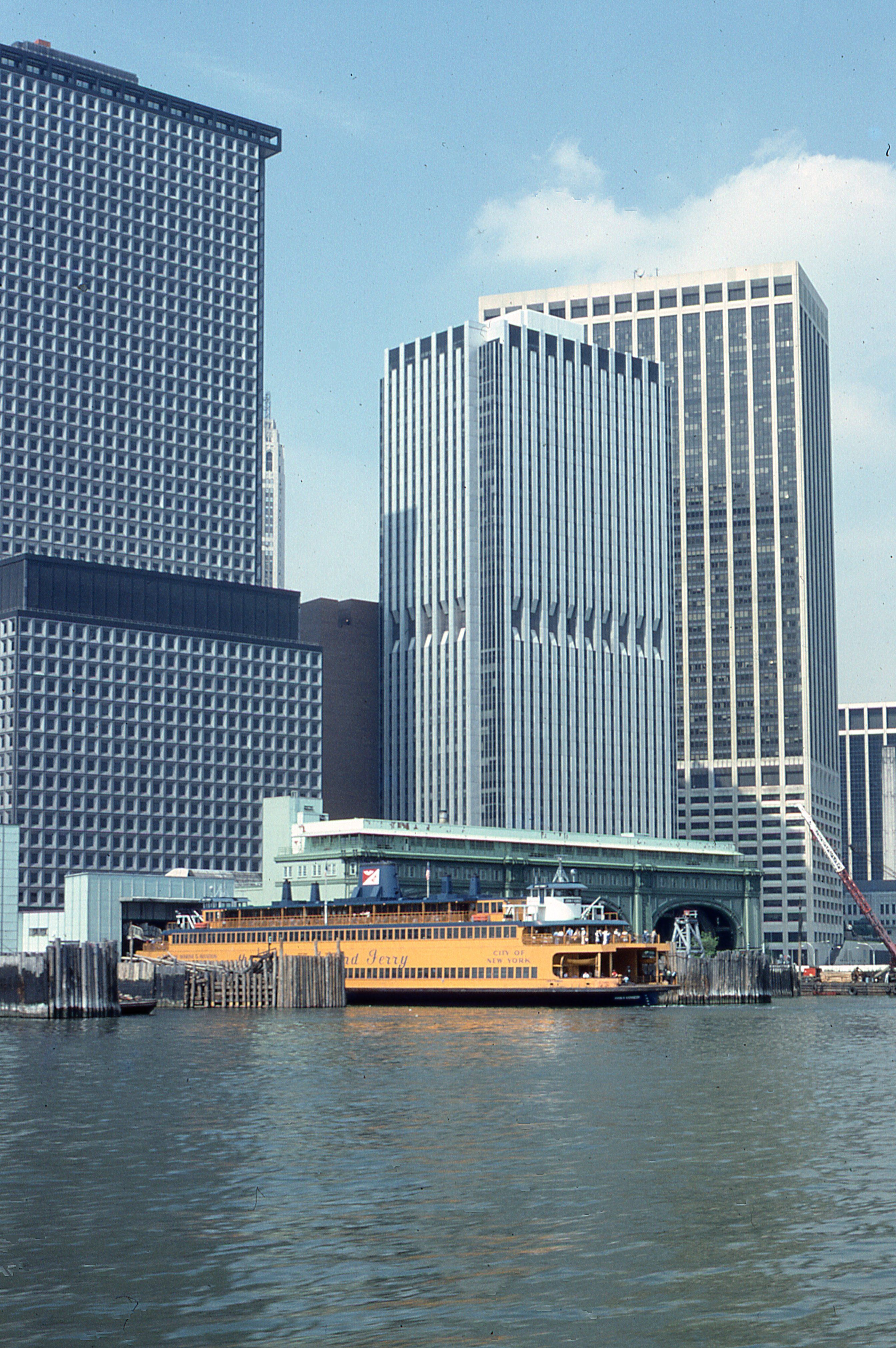 Blue and White Building near Body of Water · Free Stock Photo