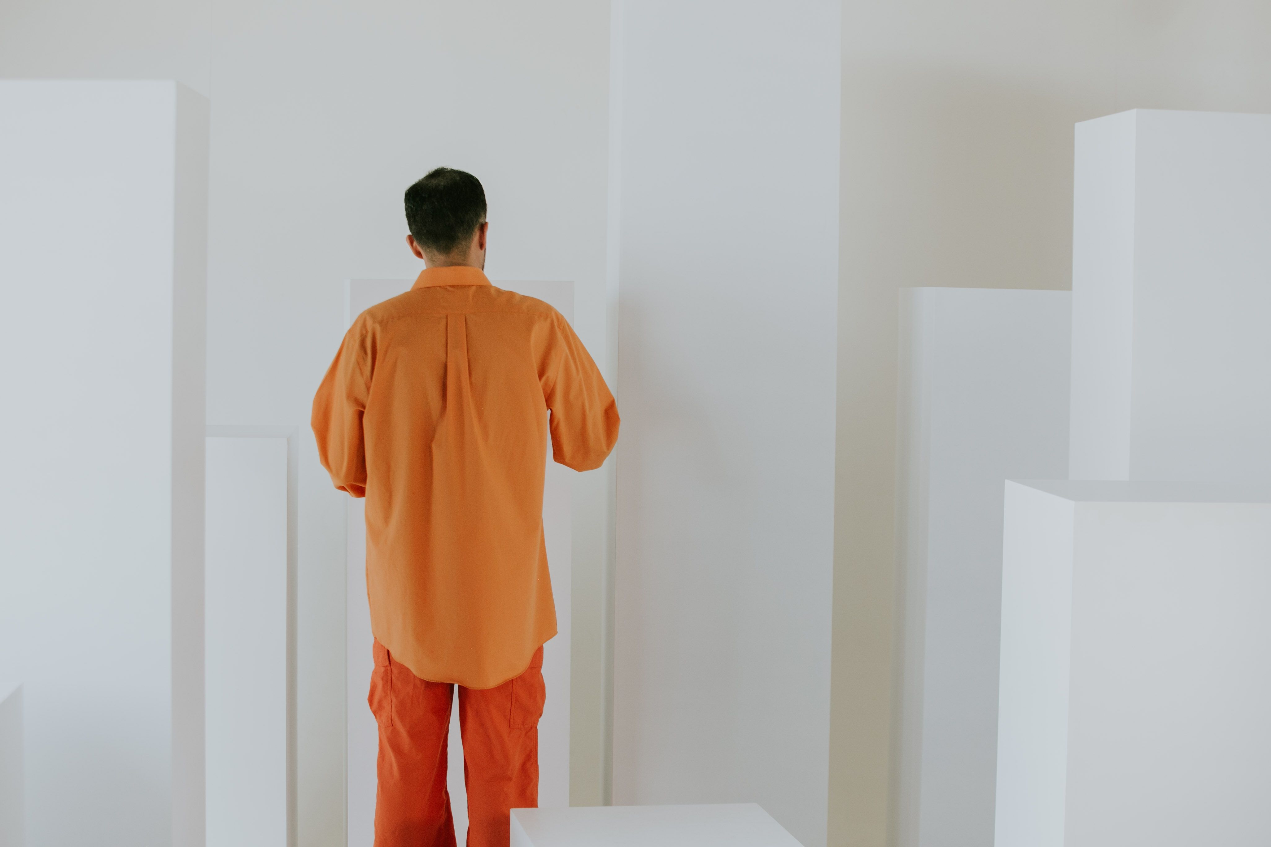 Photo of a Man Pointing at His Back · Free Stock Photo