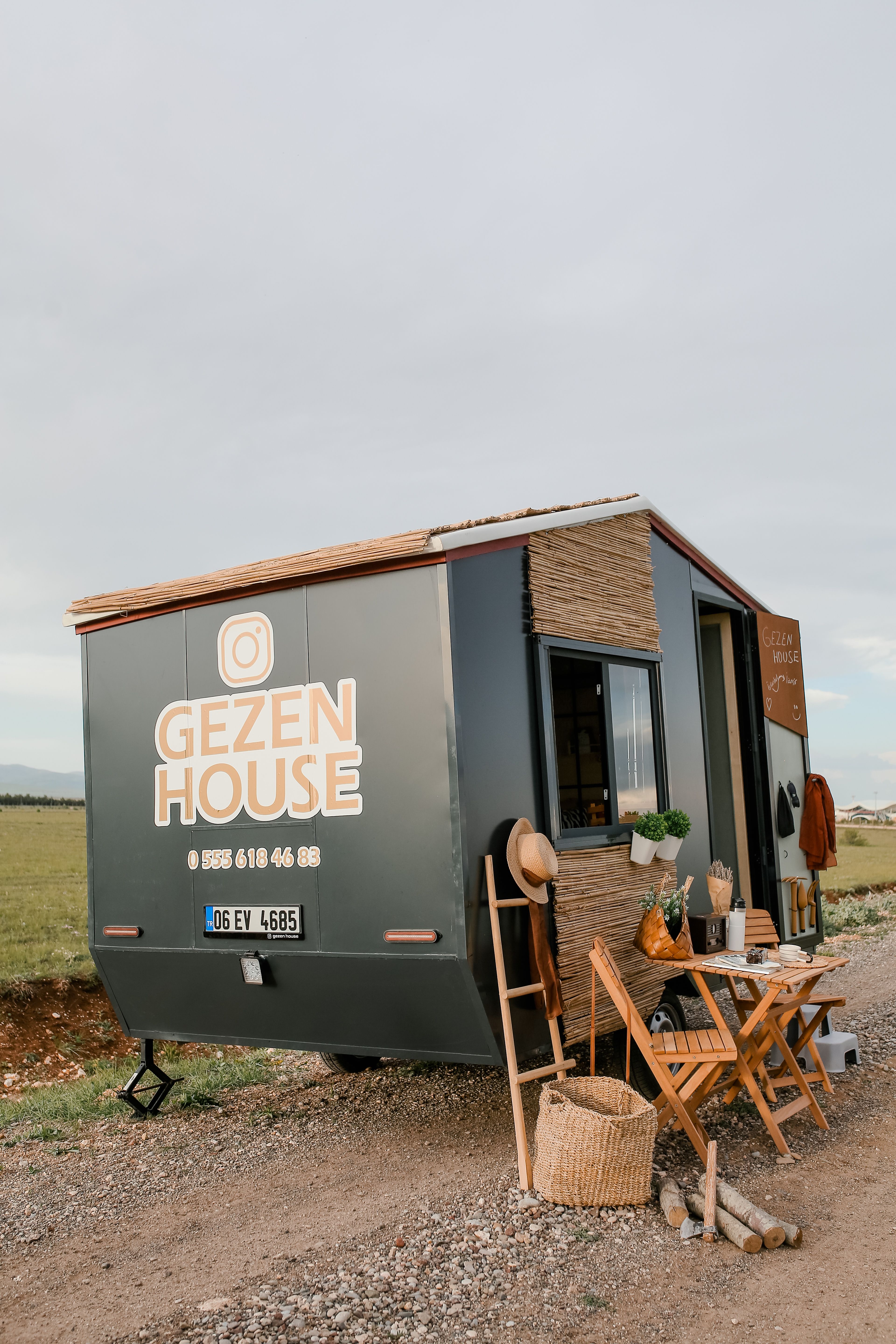 Black and Brown Tiny House on Road · Free Stock Photo