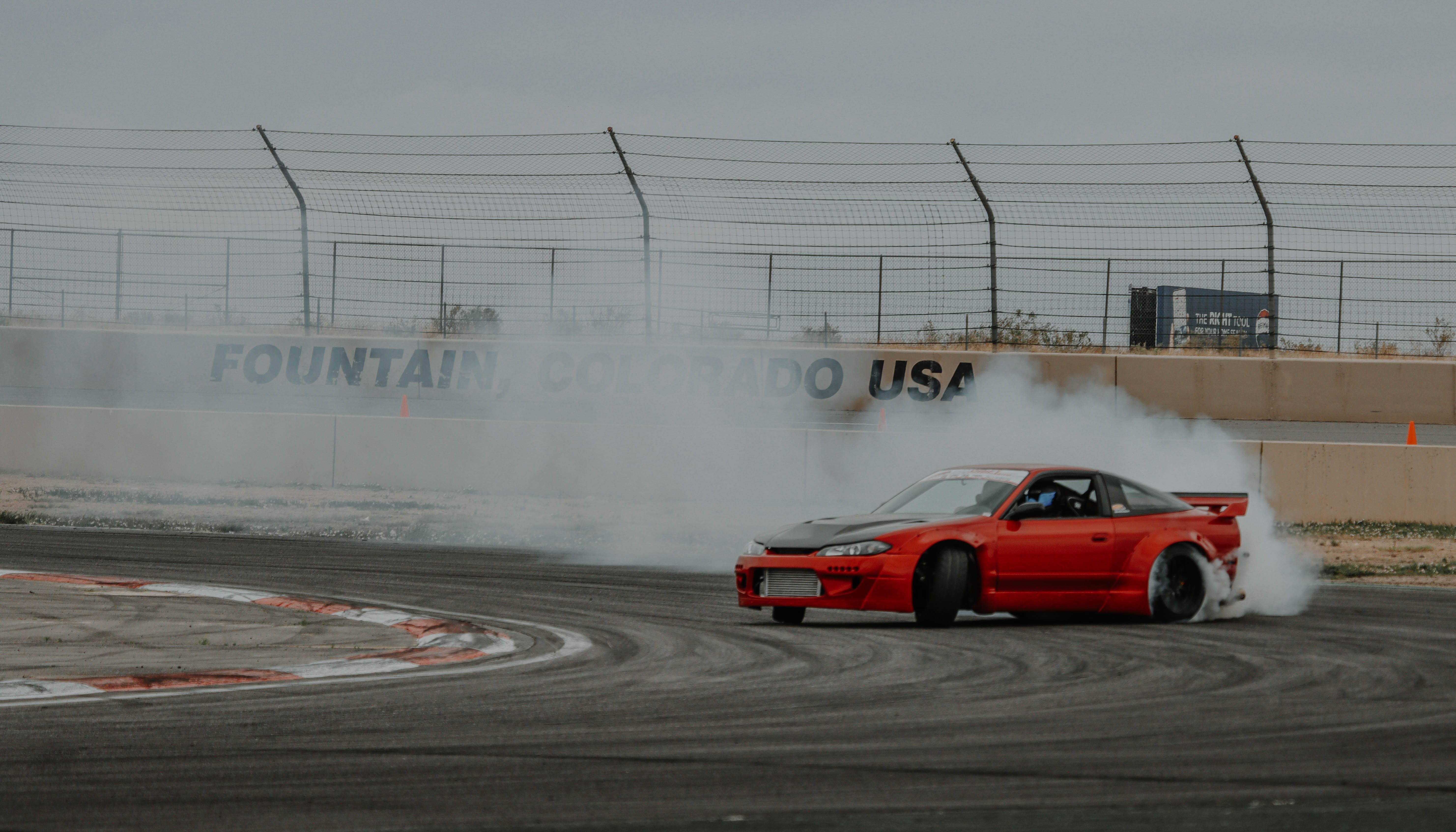 Red Nissan Racecar Drifting at Fountain Colorado · Free Stock Photo