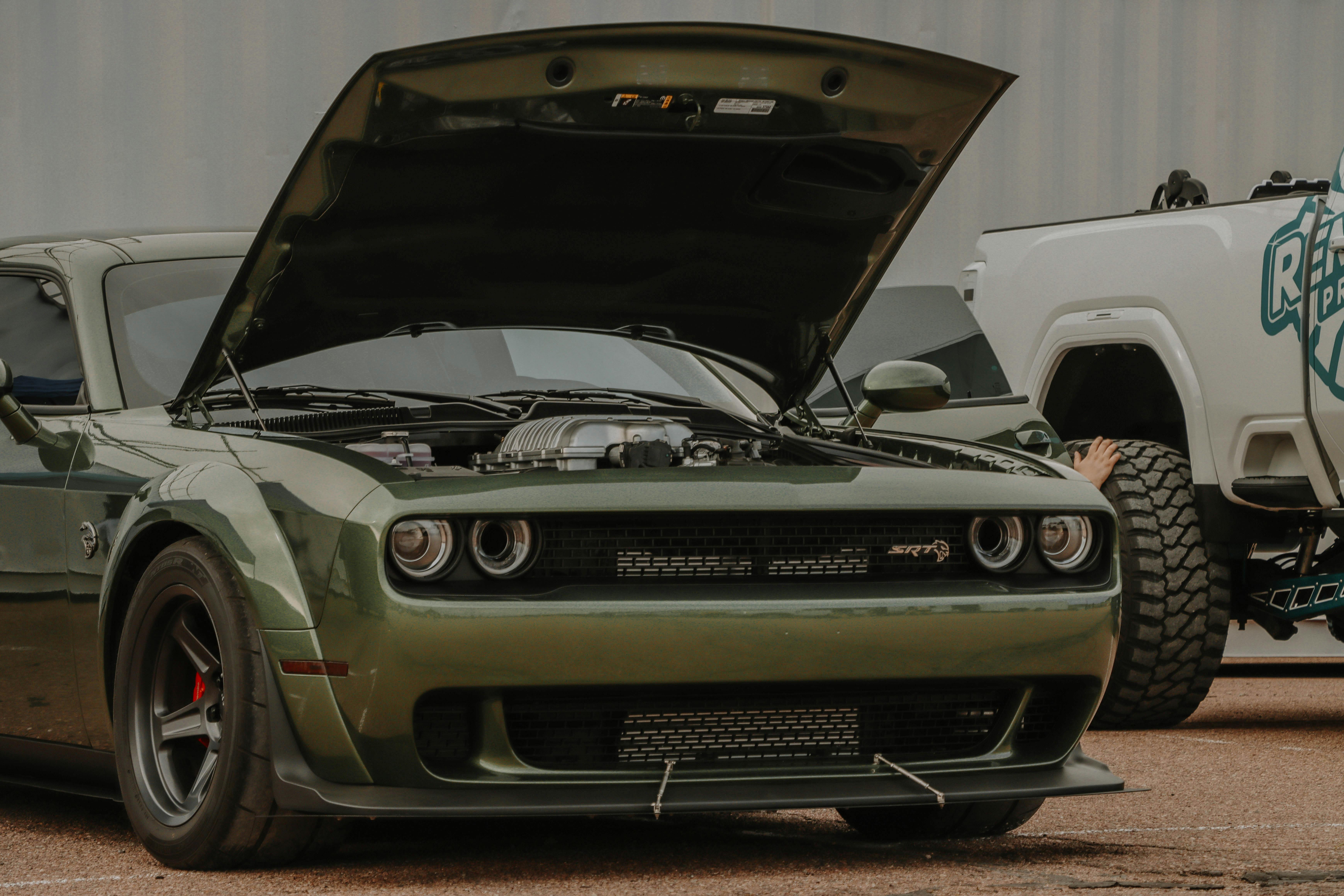 Green Dodge Challenger with Raised Hood at Outdoor Car Show · Free ...
