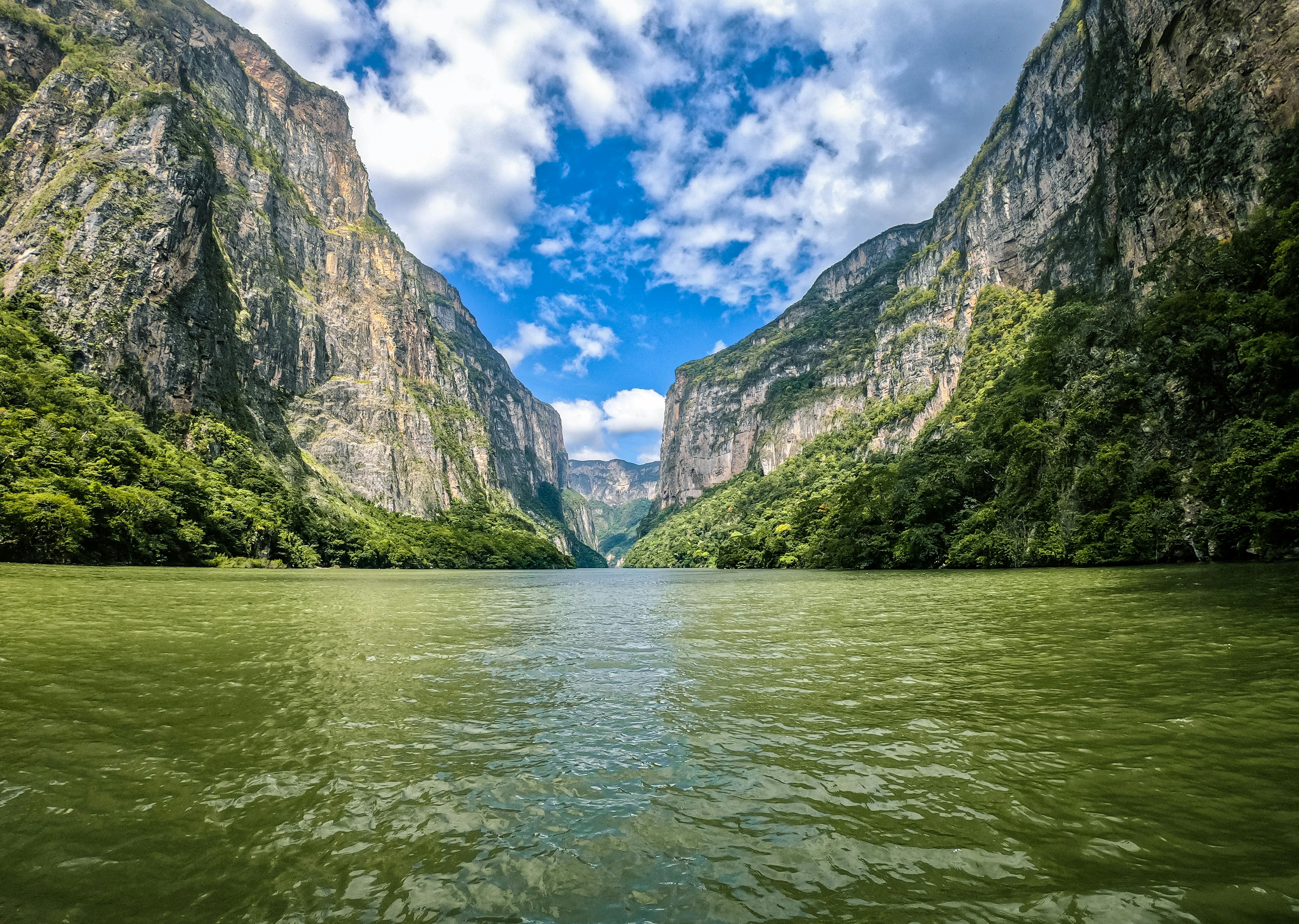 Scenic View of River between Mountains · Free Stock Photo