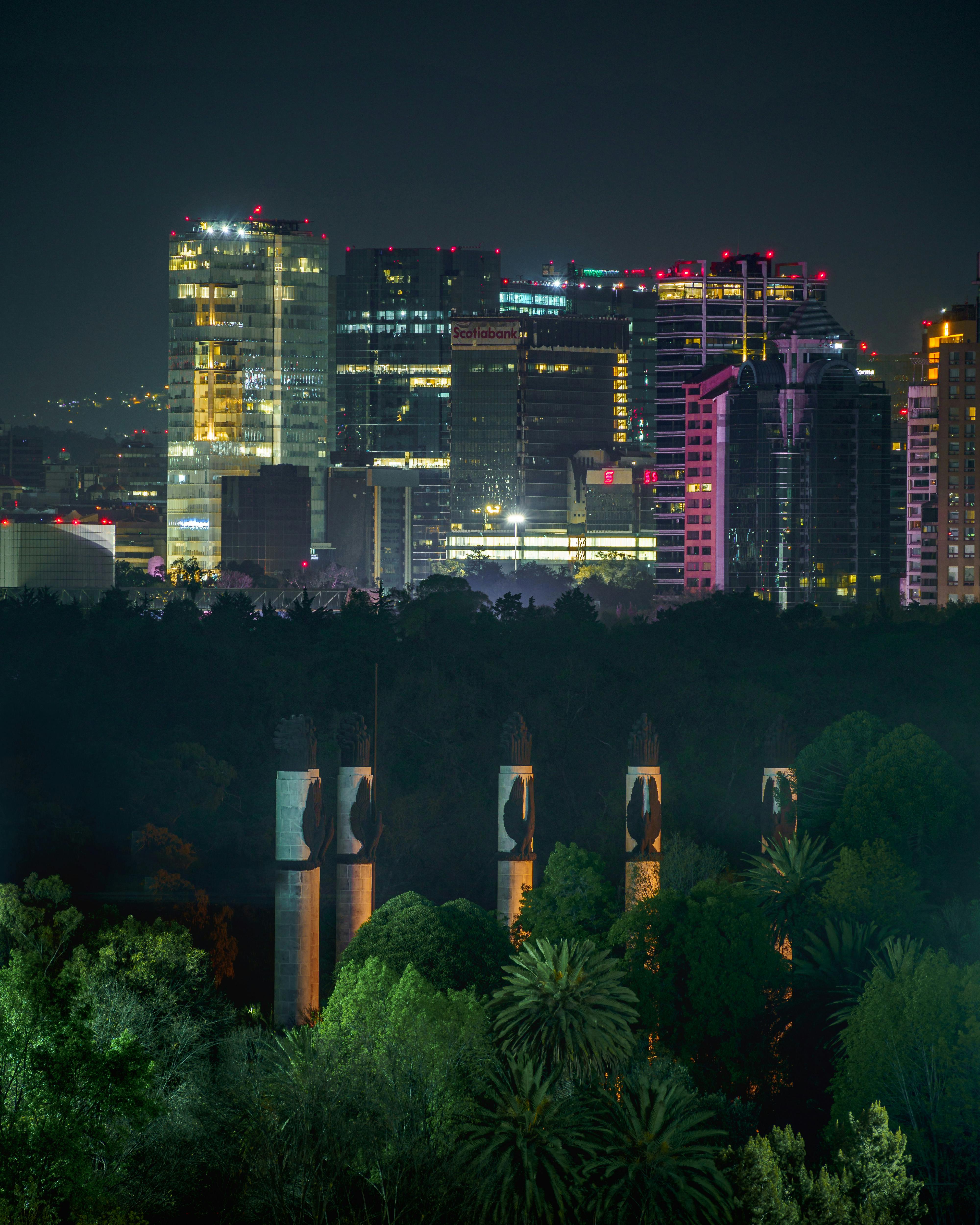 City Buildings During Night Time · Free Stock Photo