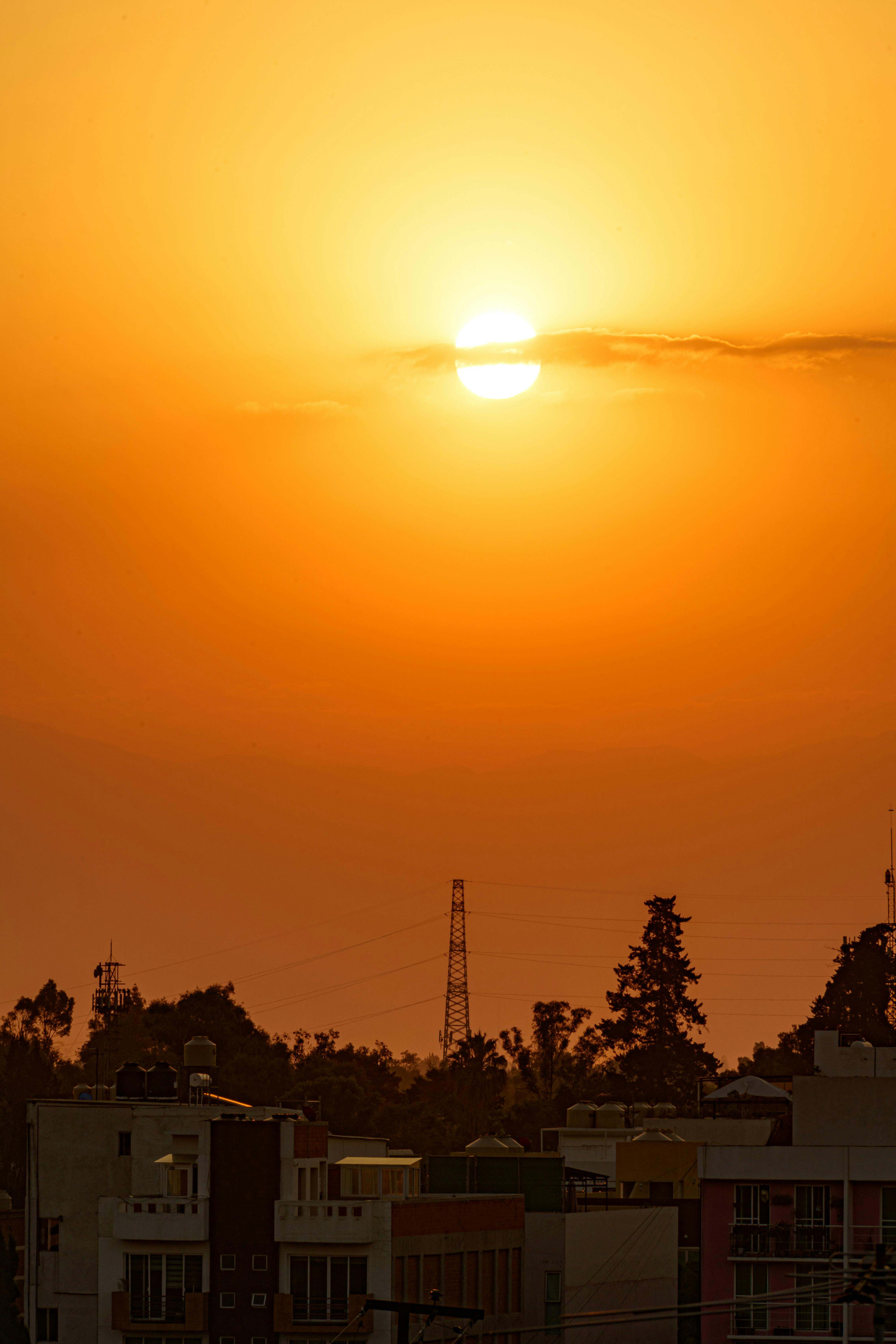 Sunlight over Town Building at Sunset · Free Stock Photo