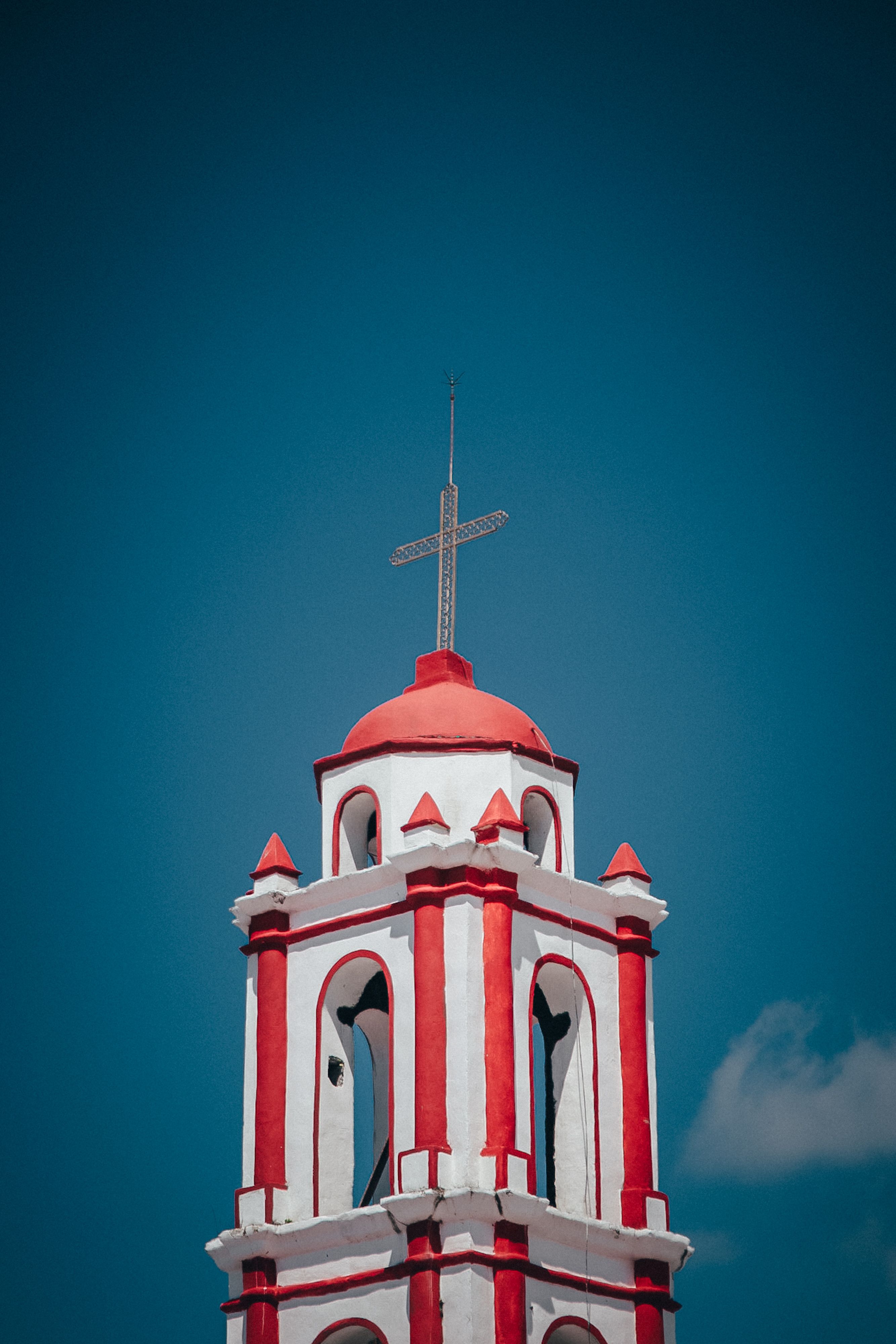 White and Red Church Tower Under Blue Sky · Free Stock Photo