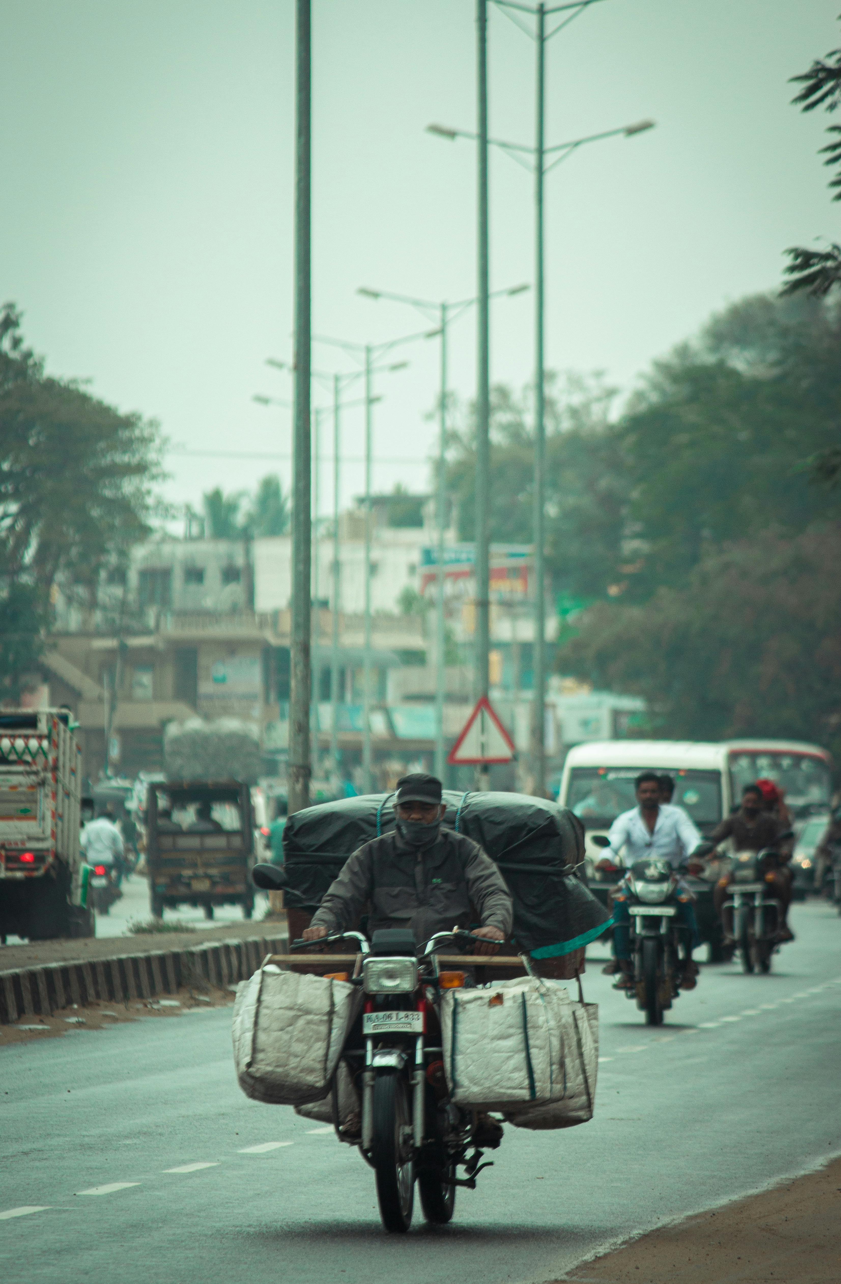 A Man Riding a Motorcycle · Free Stock Photo
