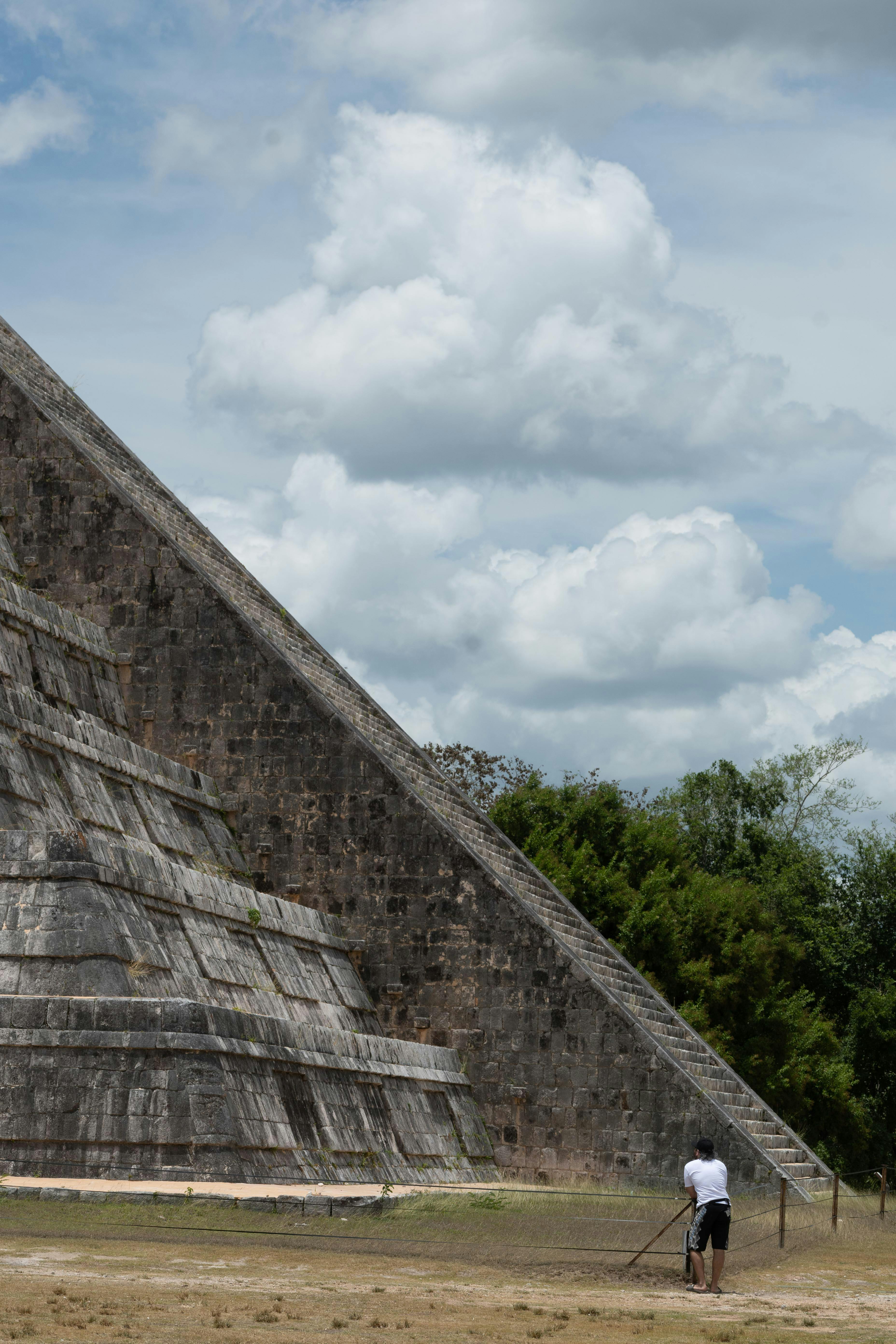 Gray Concrete Pyramid Near Green Trees · Free Stock Photo