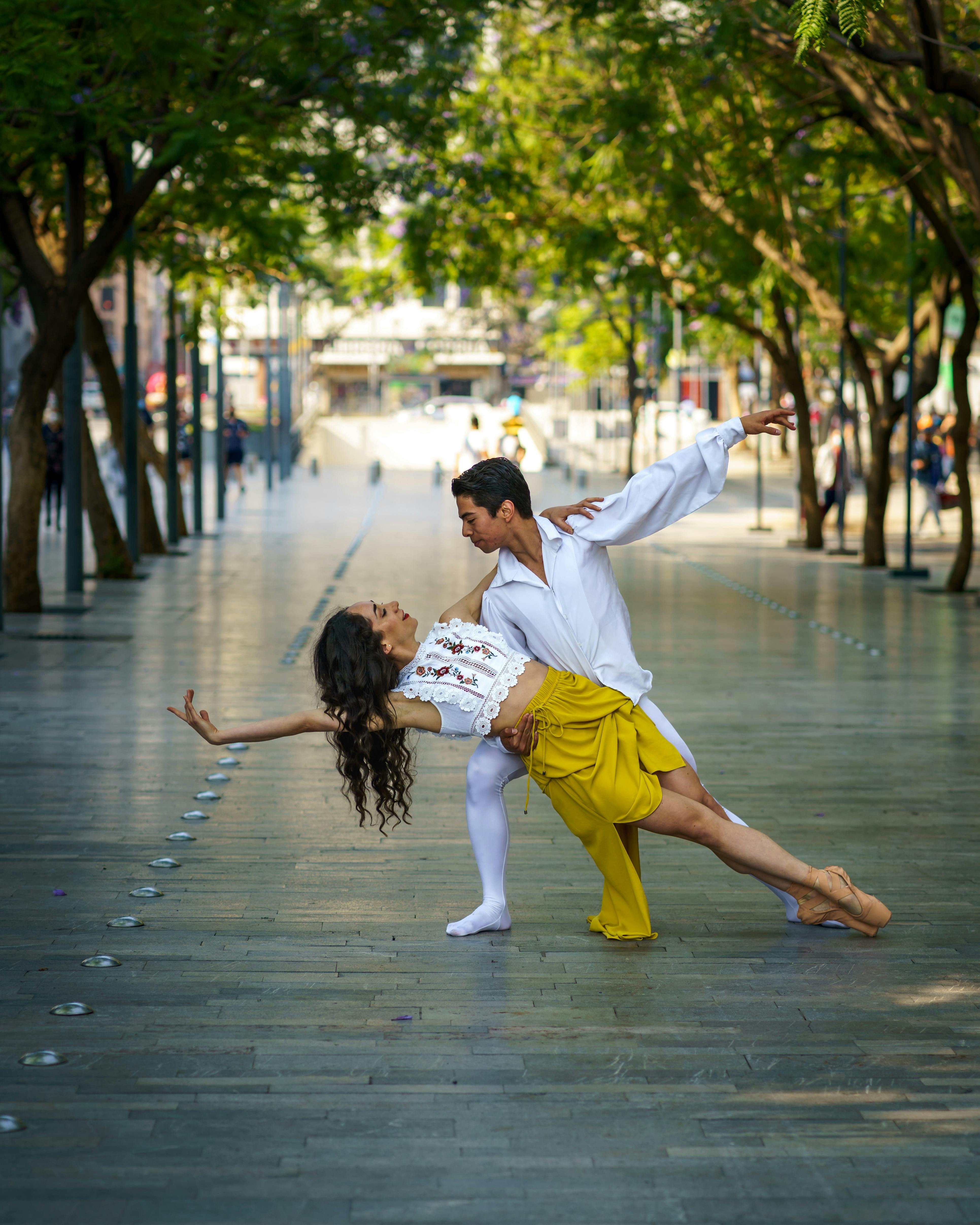 Man and Woman Dancing on the Street · Free Stock Photo