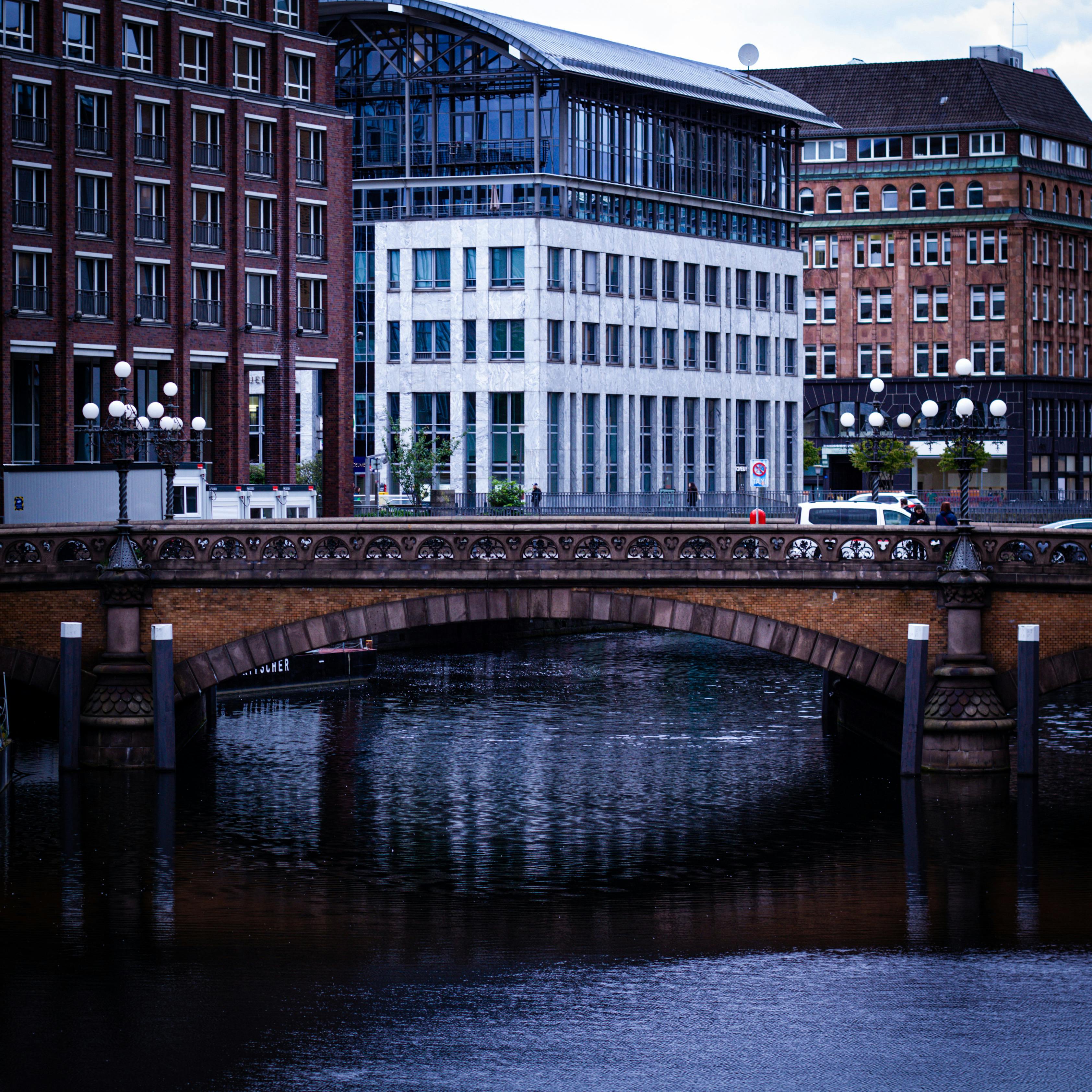 Concrete Buildings Near Bridge · Free Stock Photo
