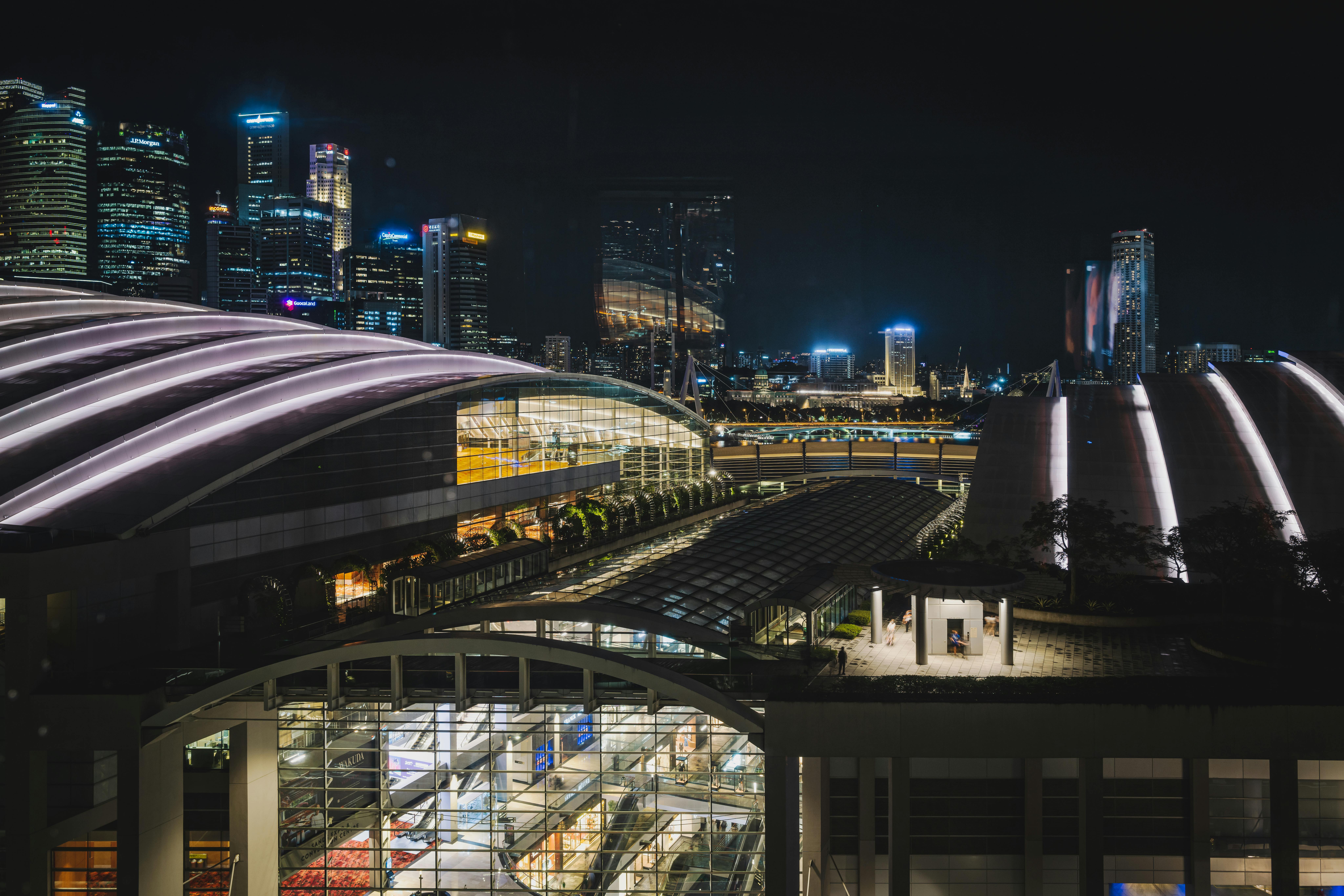 Skyscrapers above Train Station at Night · Free Stock Photo