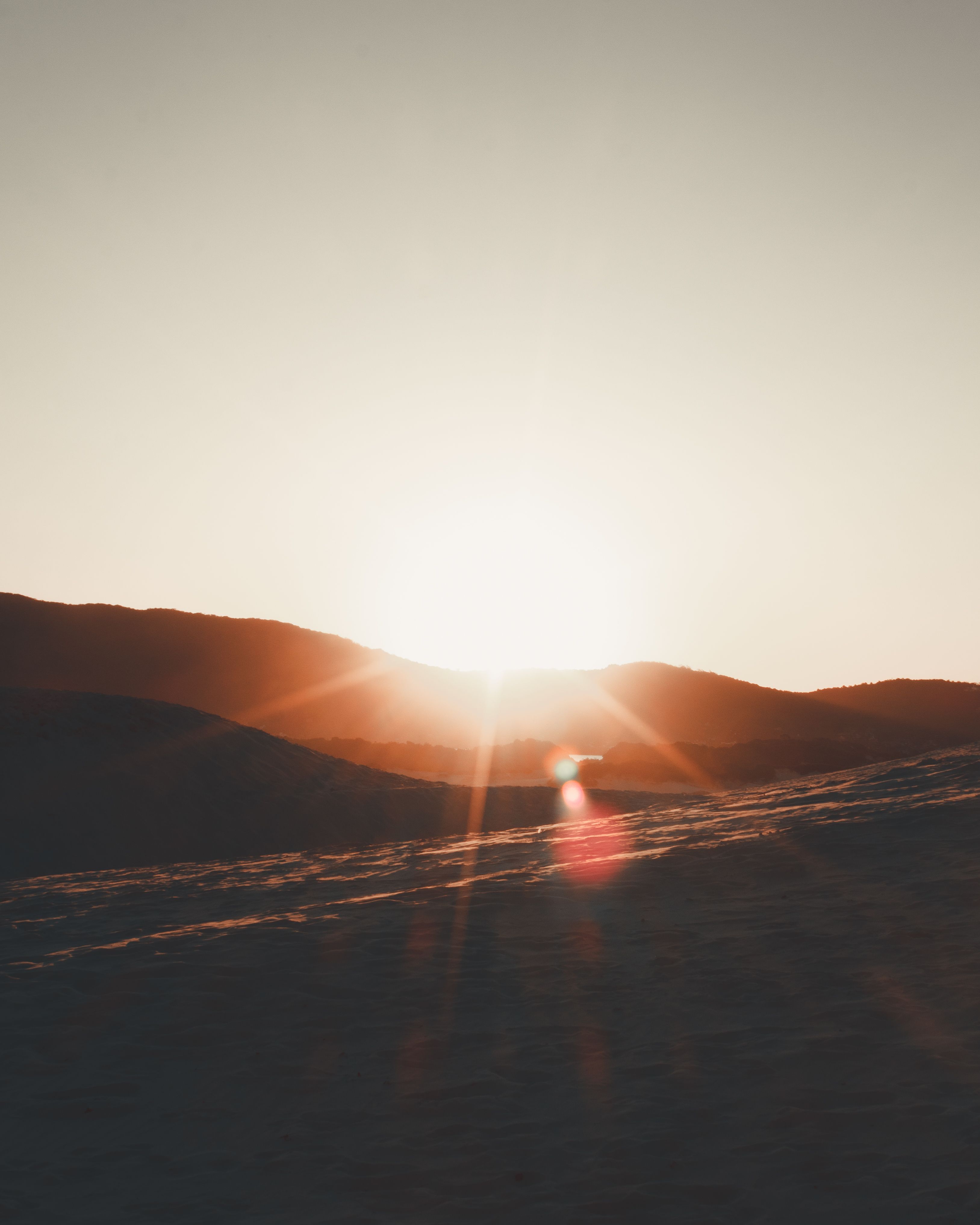 Sun Setting over the Mountains · Free Stock Photo