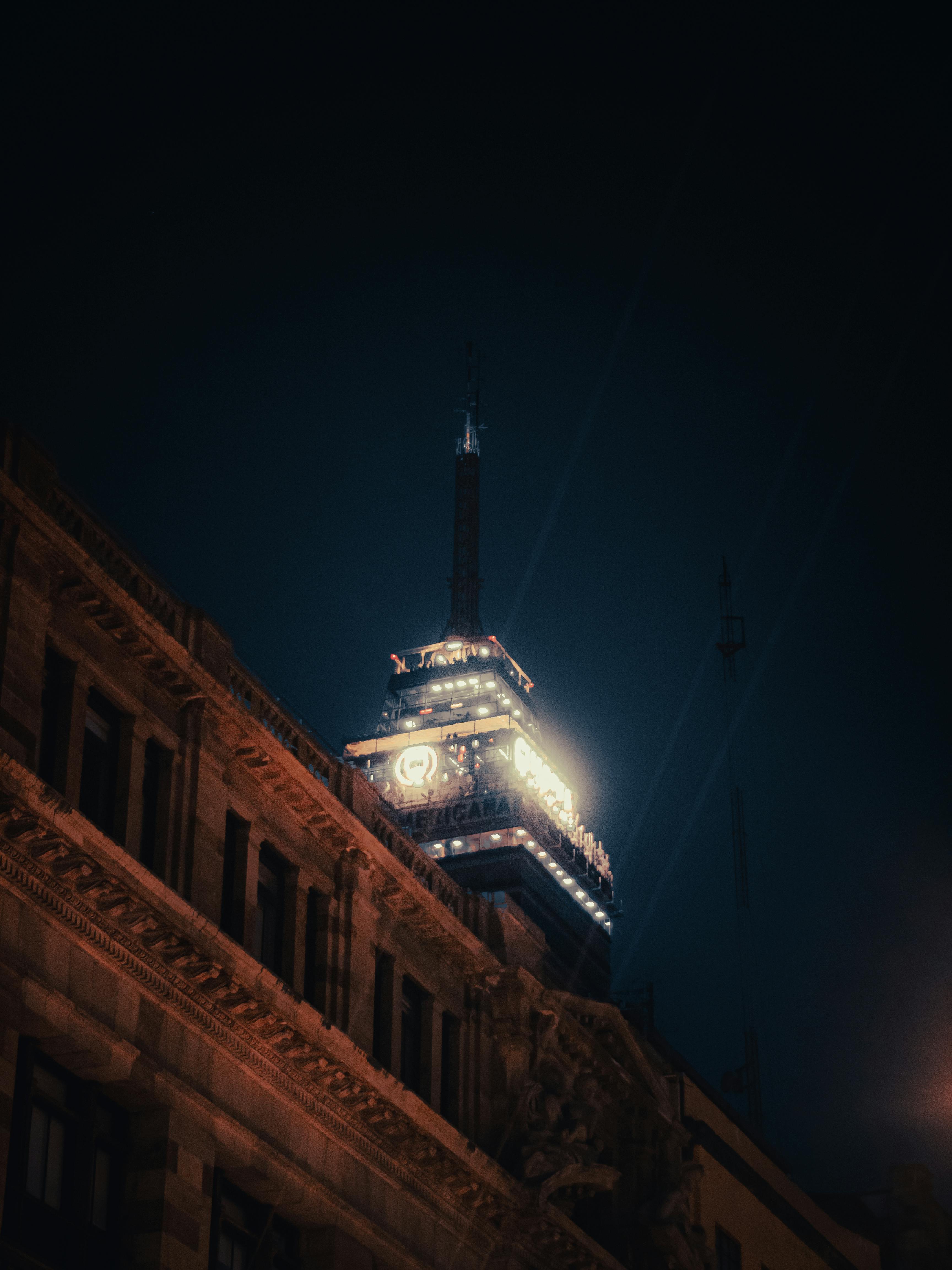 Illuminated Buildings in Night City · Free Stock Photo
