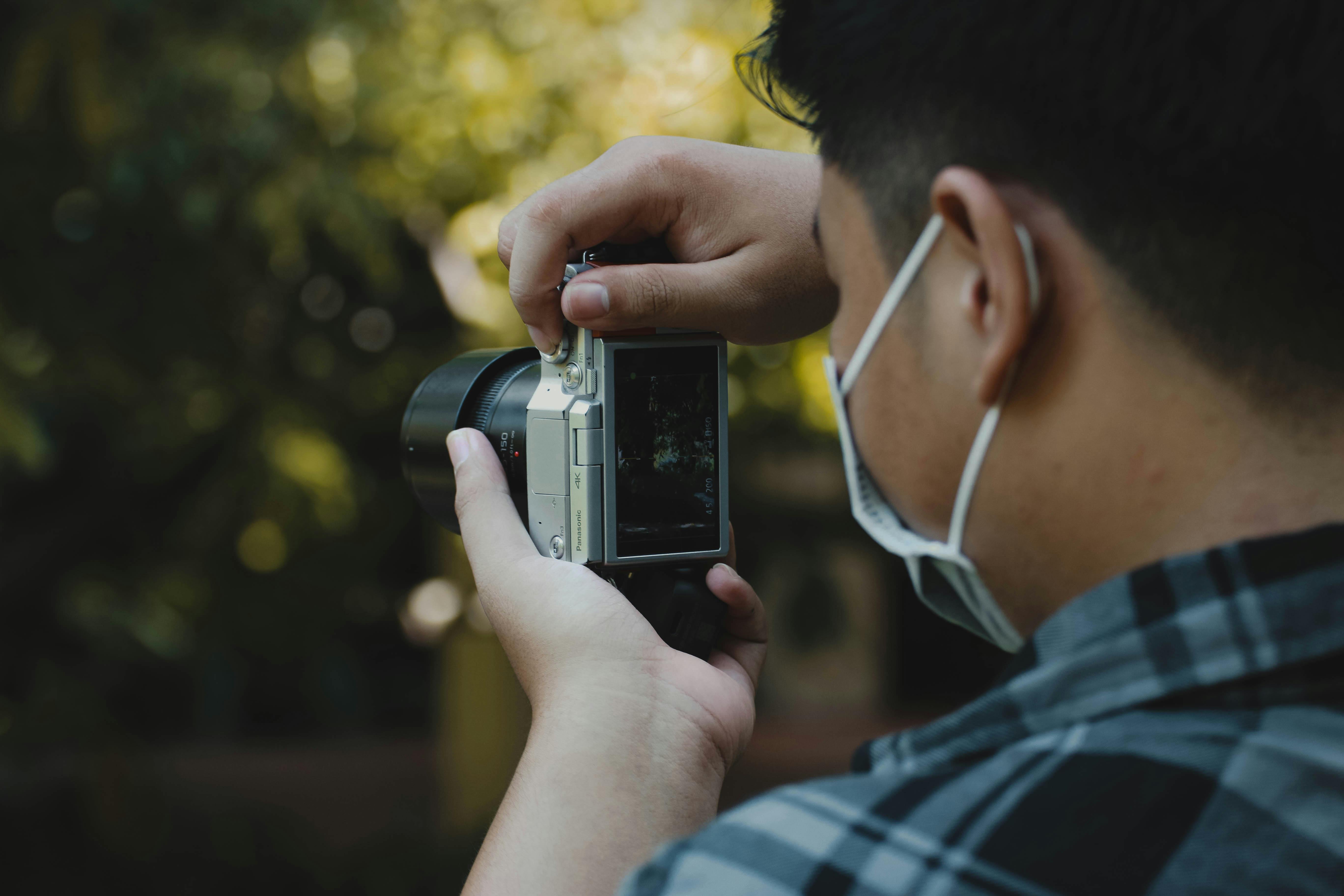 A Person Using Camera · Free Stock Photo